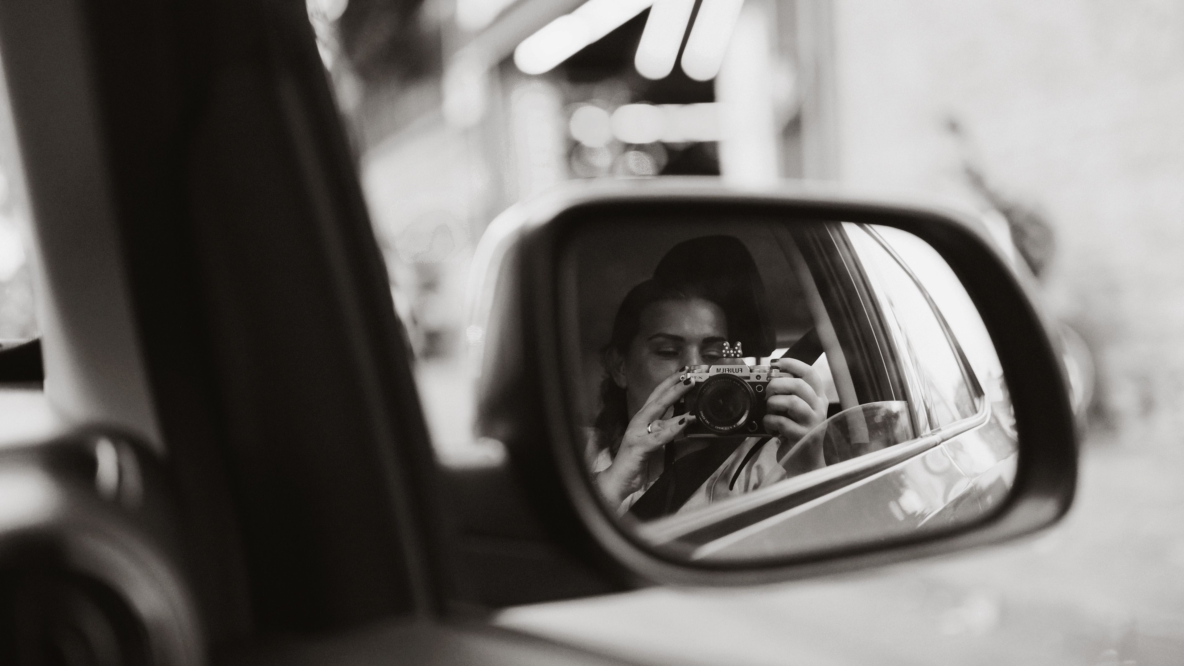 Reflection in Car Side Mirror with Camera · Free Stock Photo