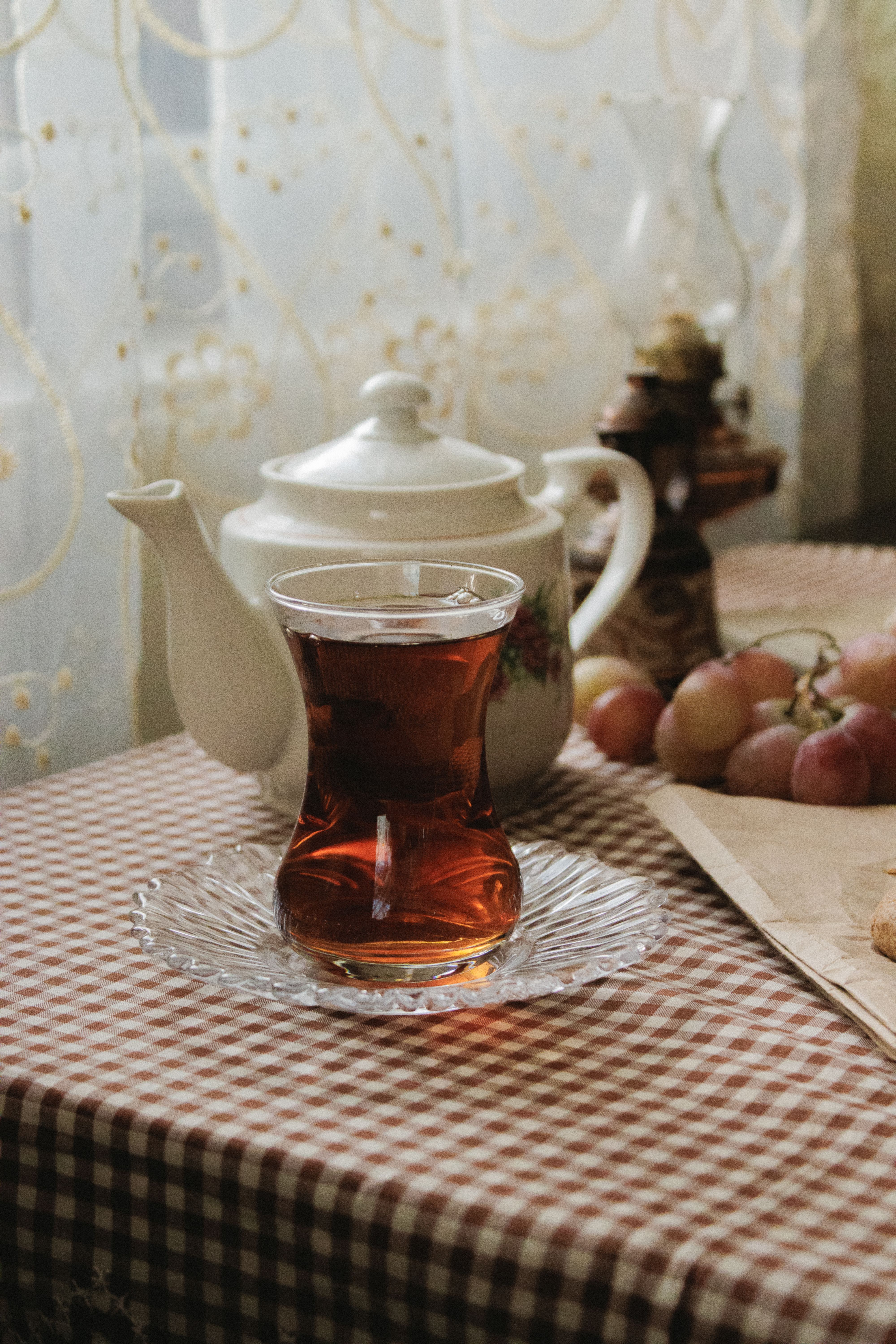 Cozy Tea Time Setting with Grapes and Pot · Free Stock Photo