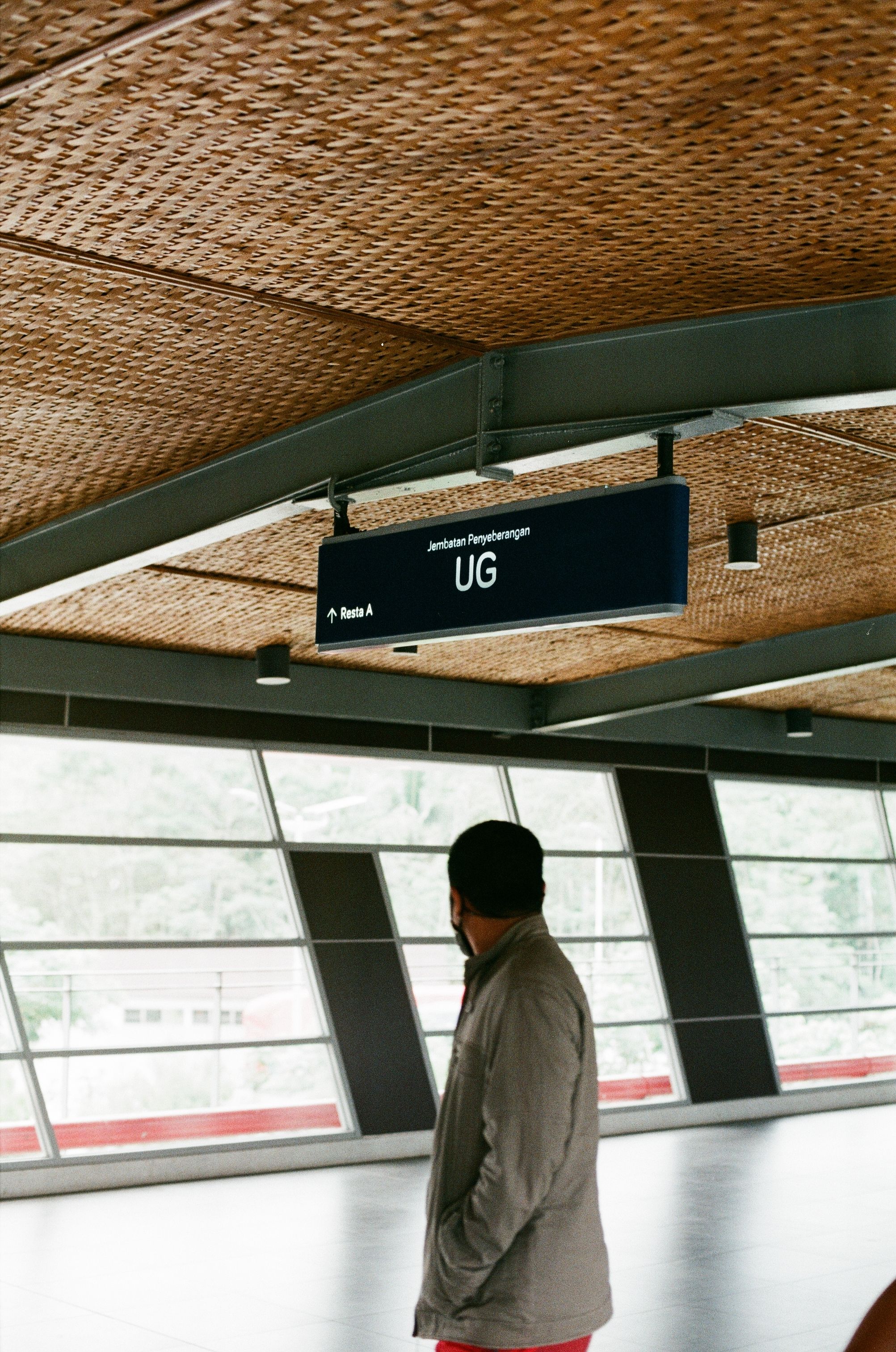 Commuter in Indonesian Transit Station · Free Stock Photo