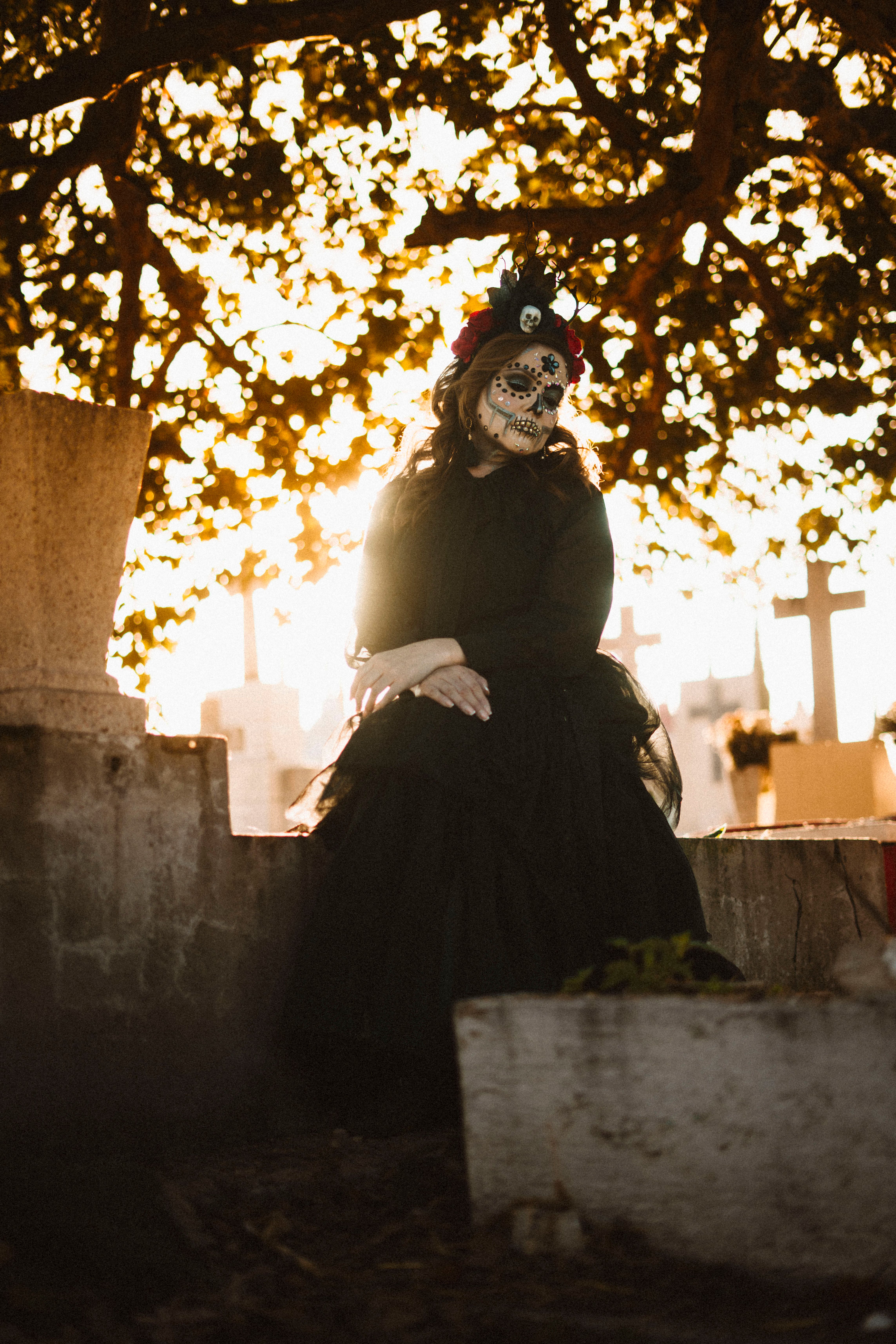 Elegant Woman in Cemetery at Sunlight · Free Stock Photo