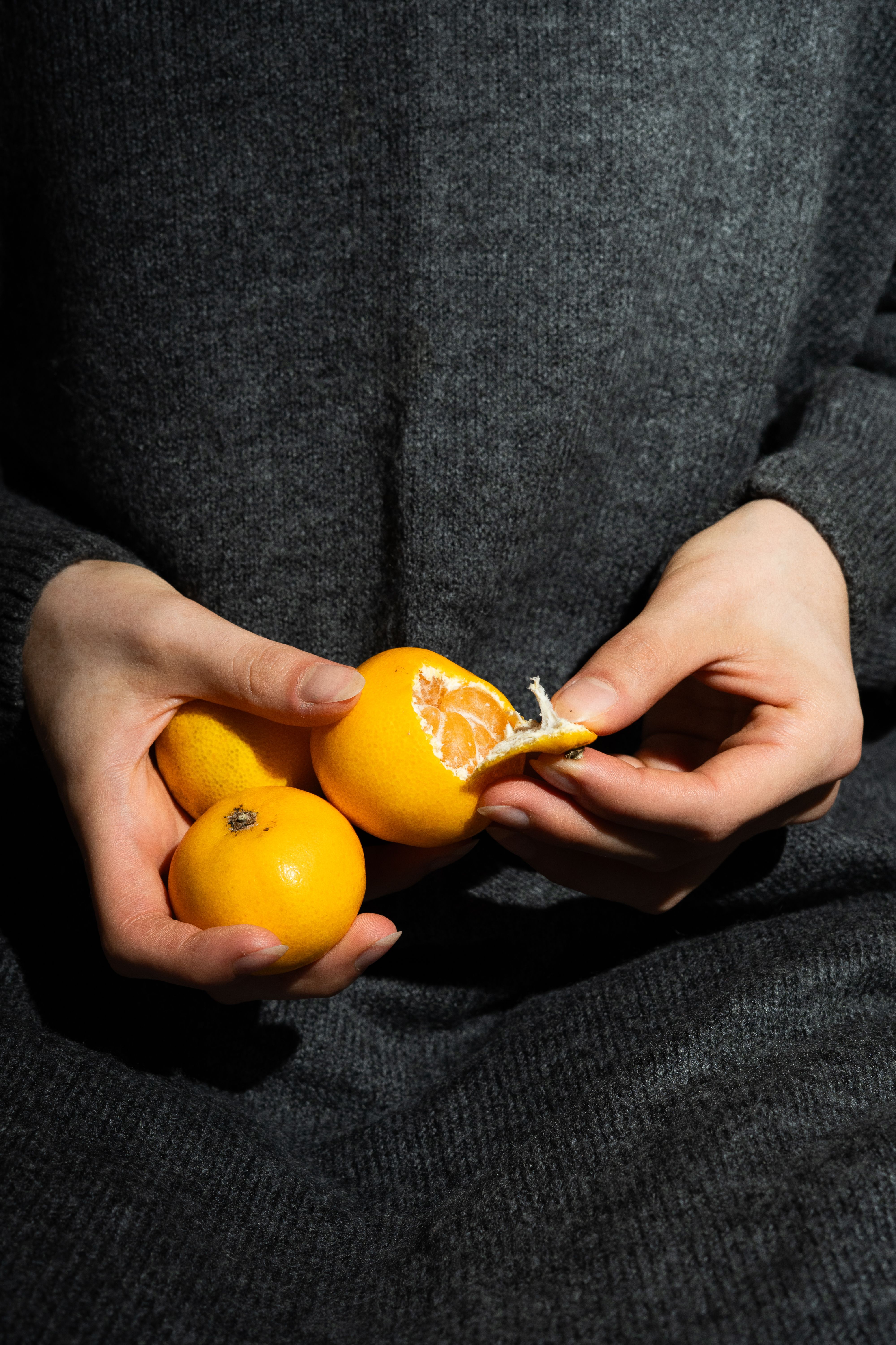 Close-up of Person Peeling Juicy Oranges · Free Stock Photo