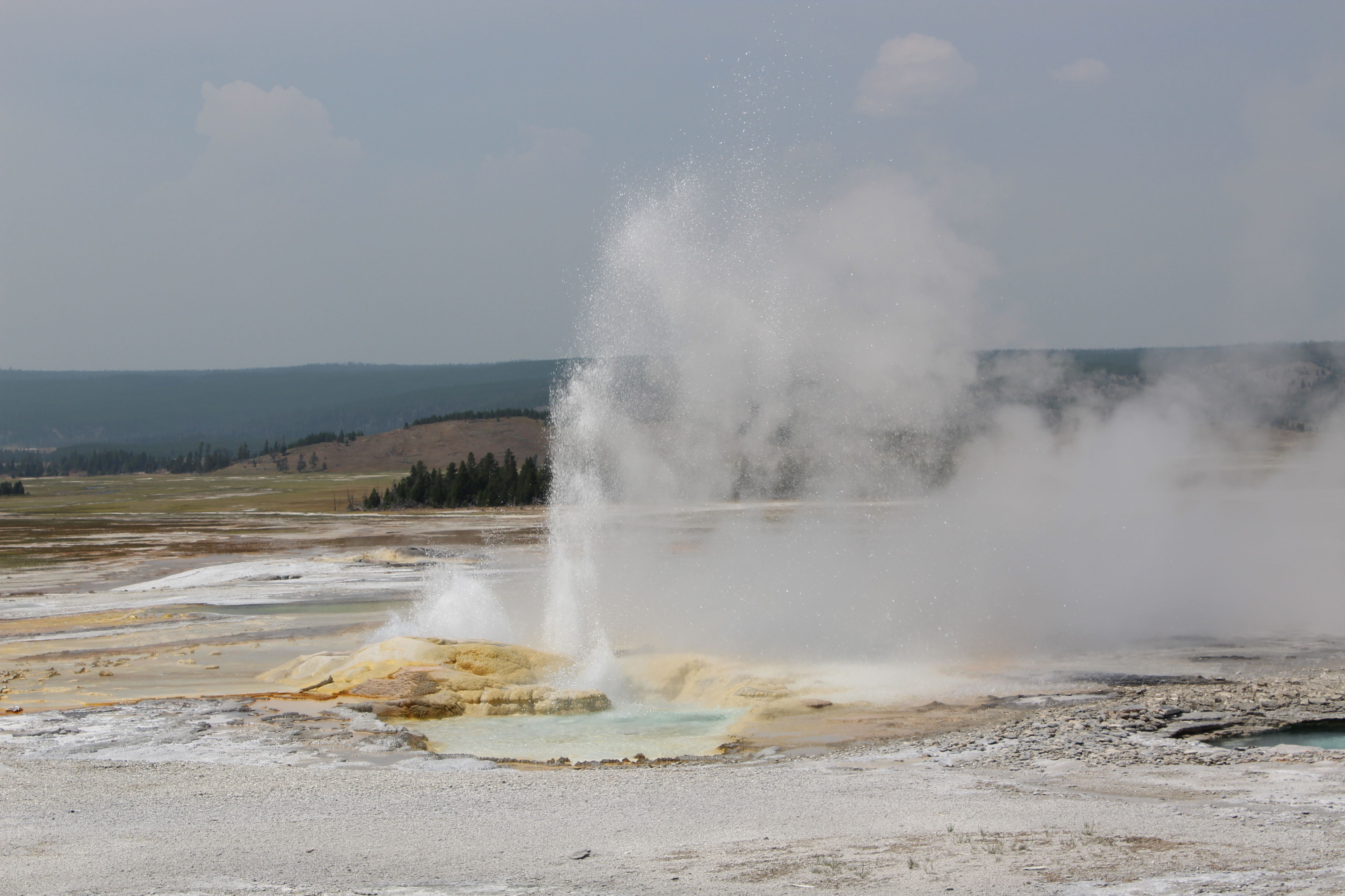 Dramatic Geyser Eruption at Yellowstone Park · Free Stock Photo