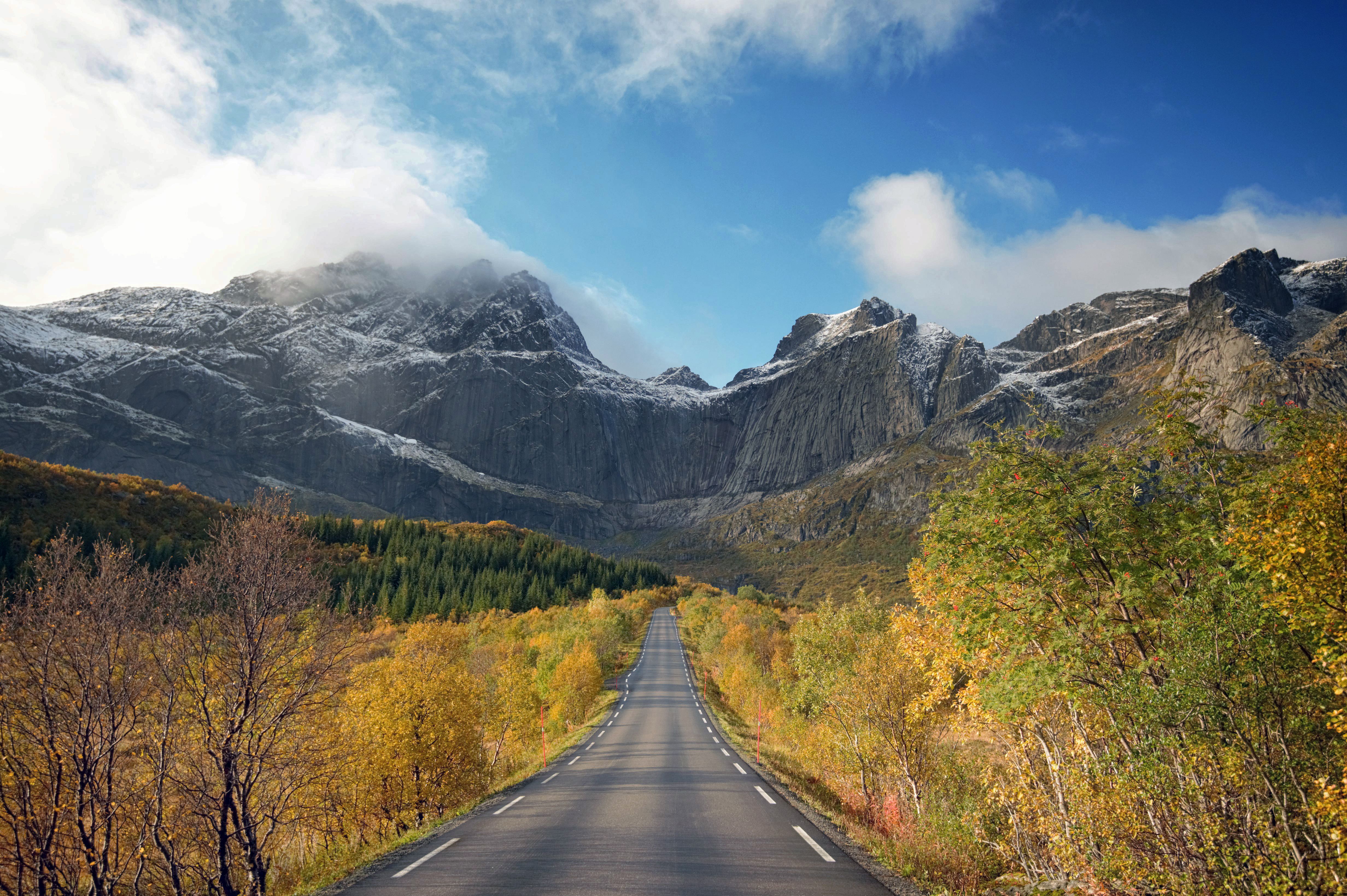Empty Road Across Mountains · Free Stock Photo