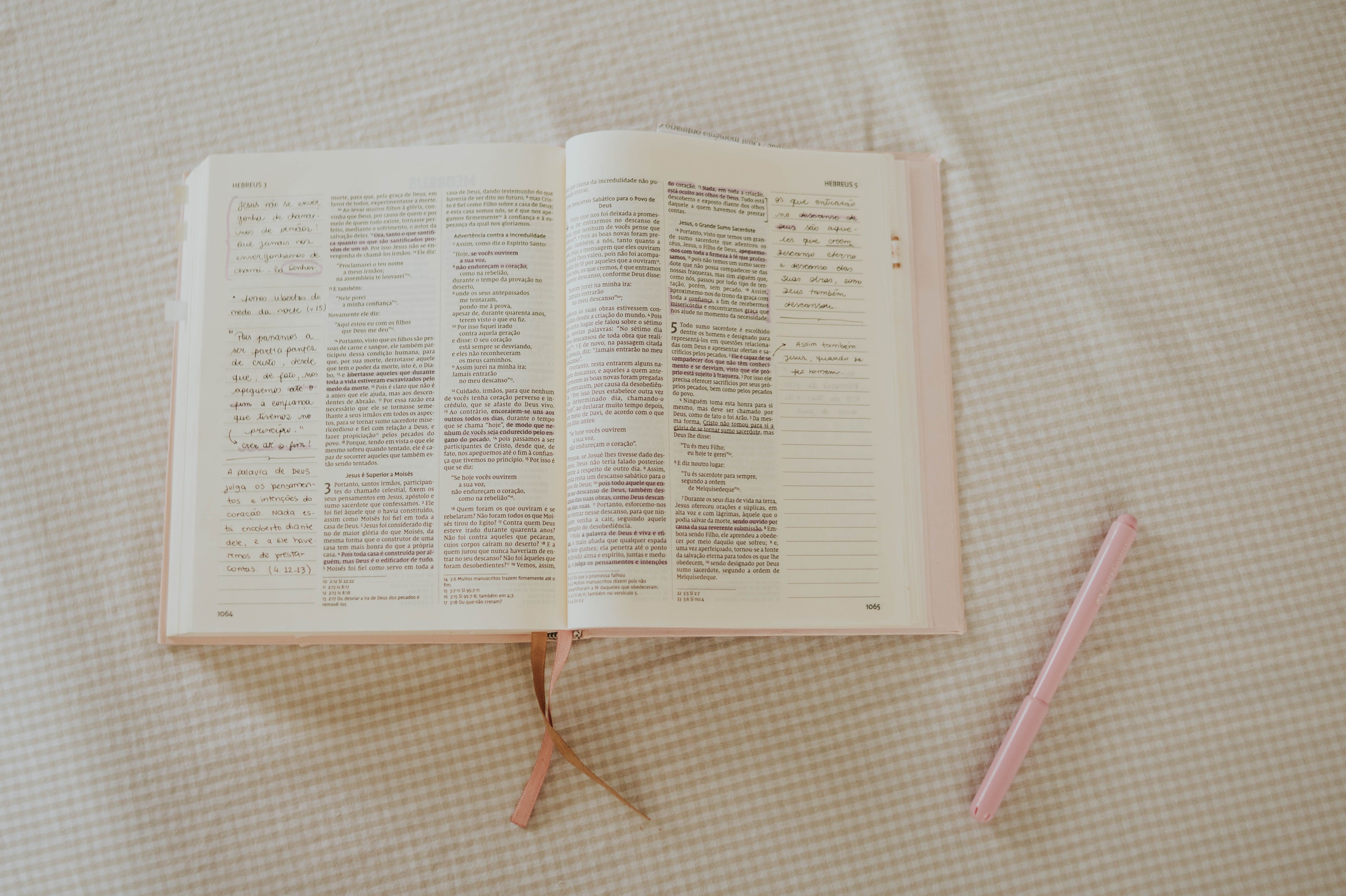 Open Book on Gingham Fabric with Pink Pen · Free Stock Photo