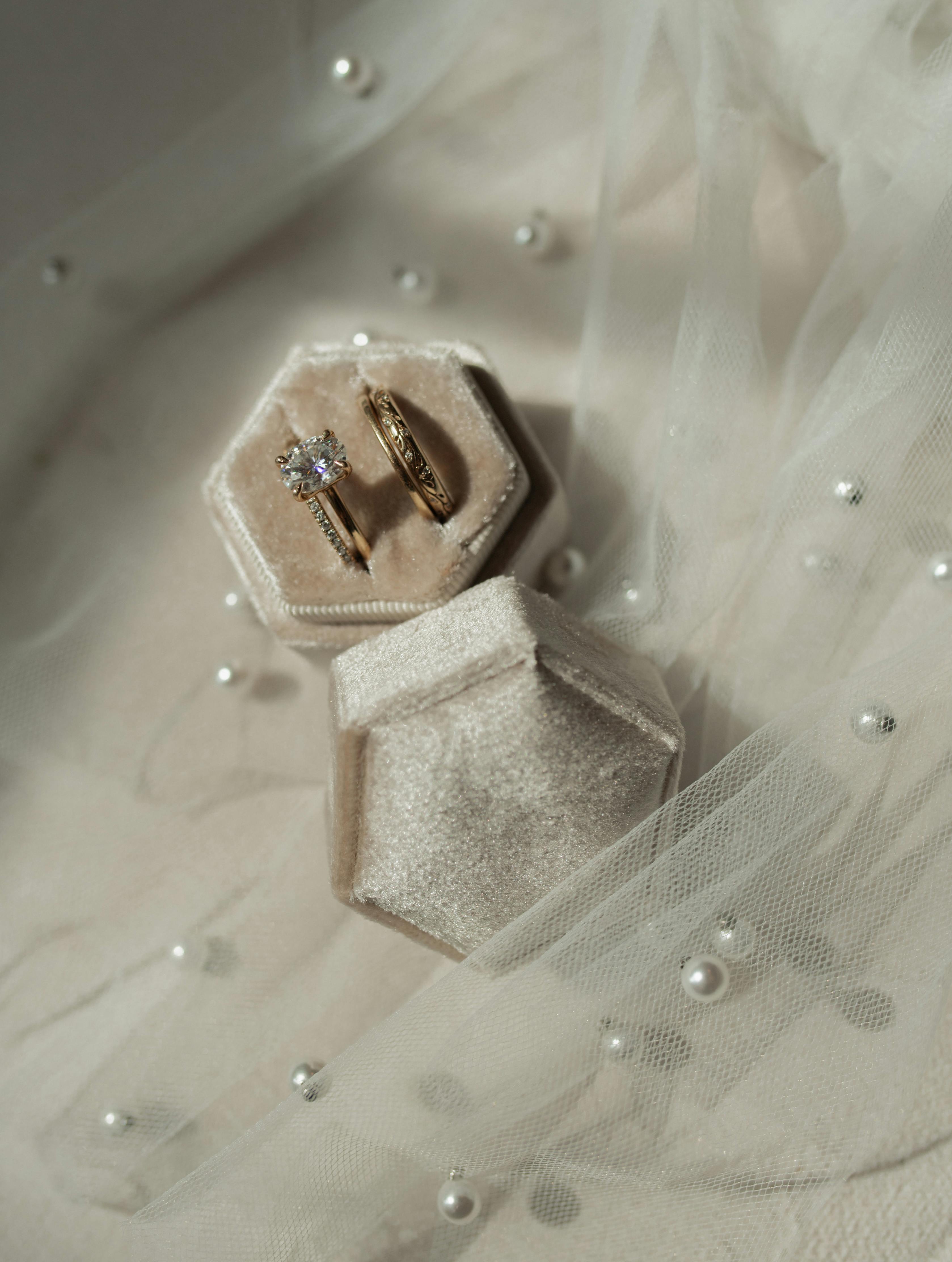 Elegant Engagement and Wedding Rings on Velvet · Free Stock Photo