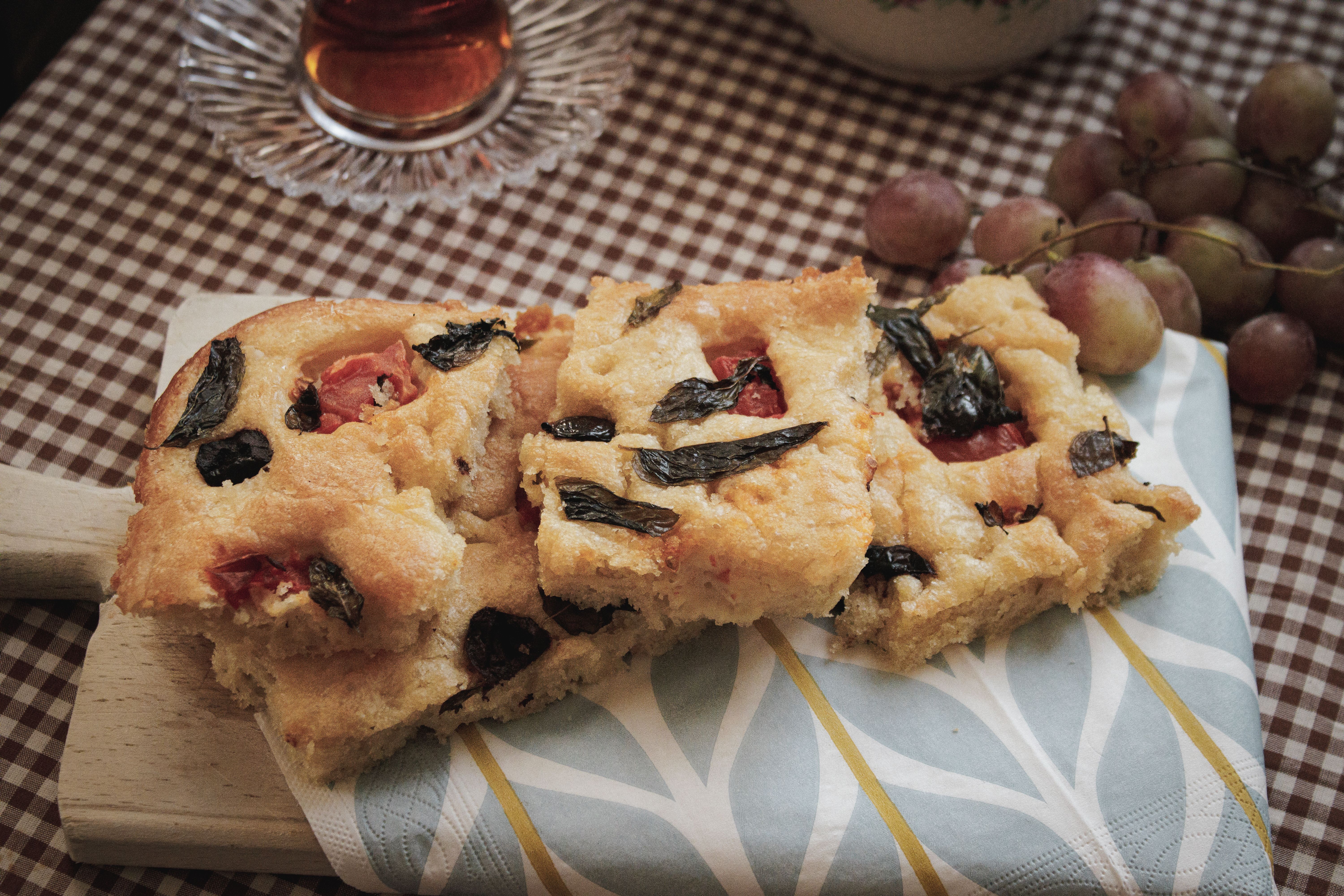 Rustic Focaccia Bread with Grapes and Herbs · Free Stock Photo