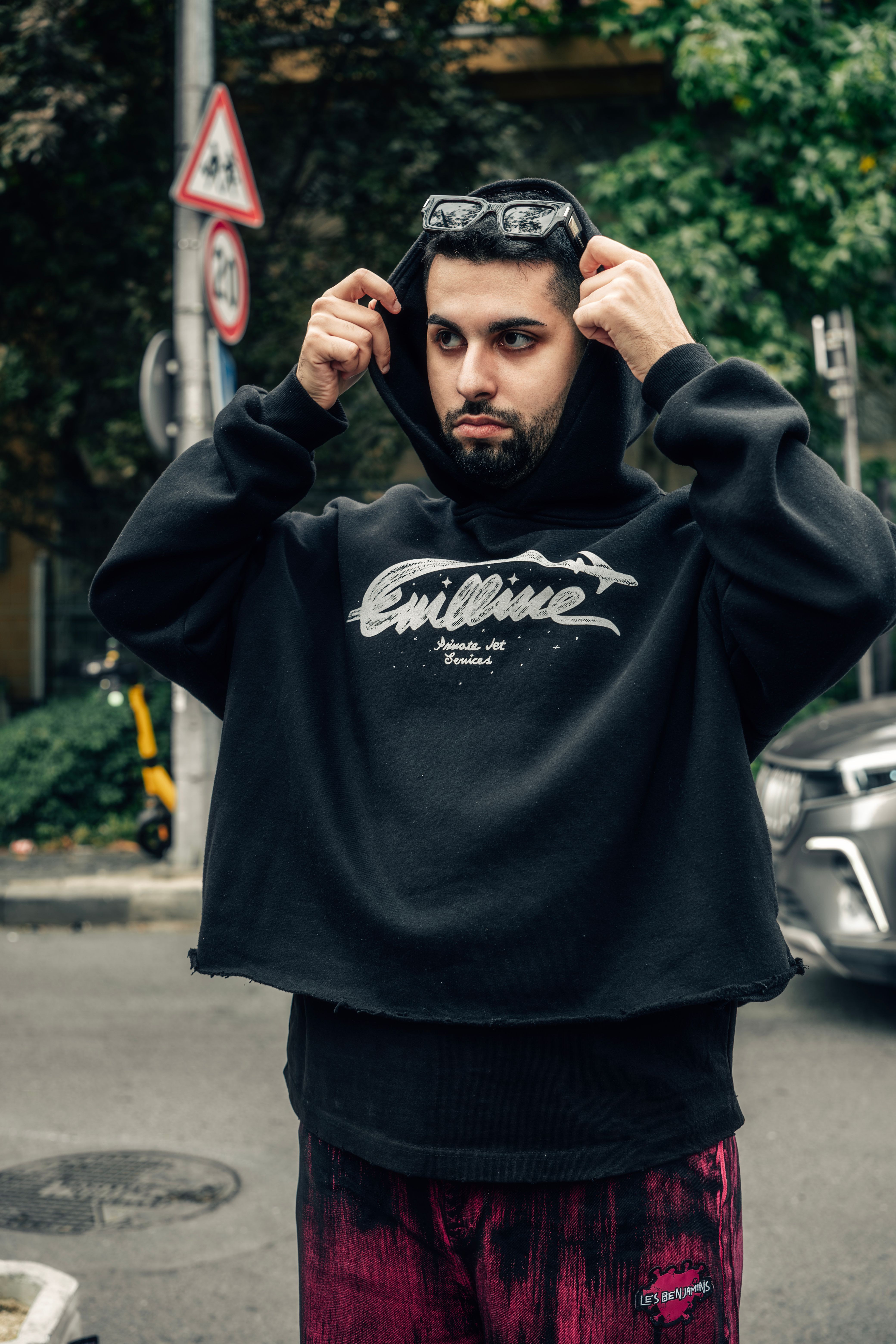 Street Style Portrait of Man in Hooded Sweatshirt · Free Stock Photo