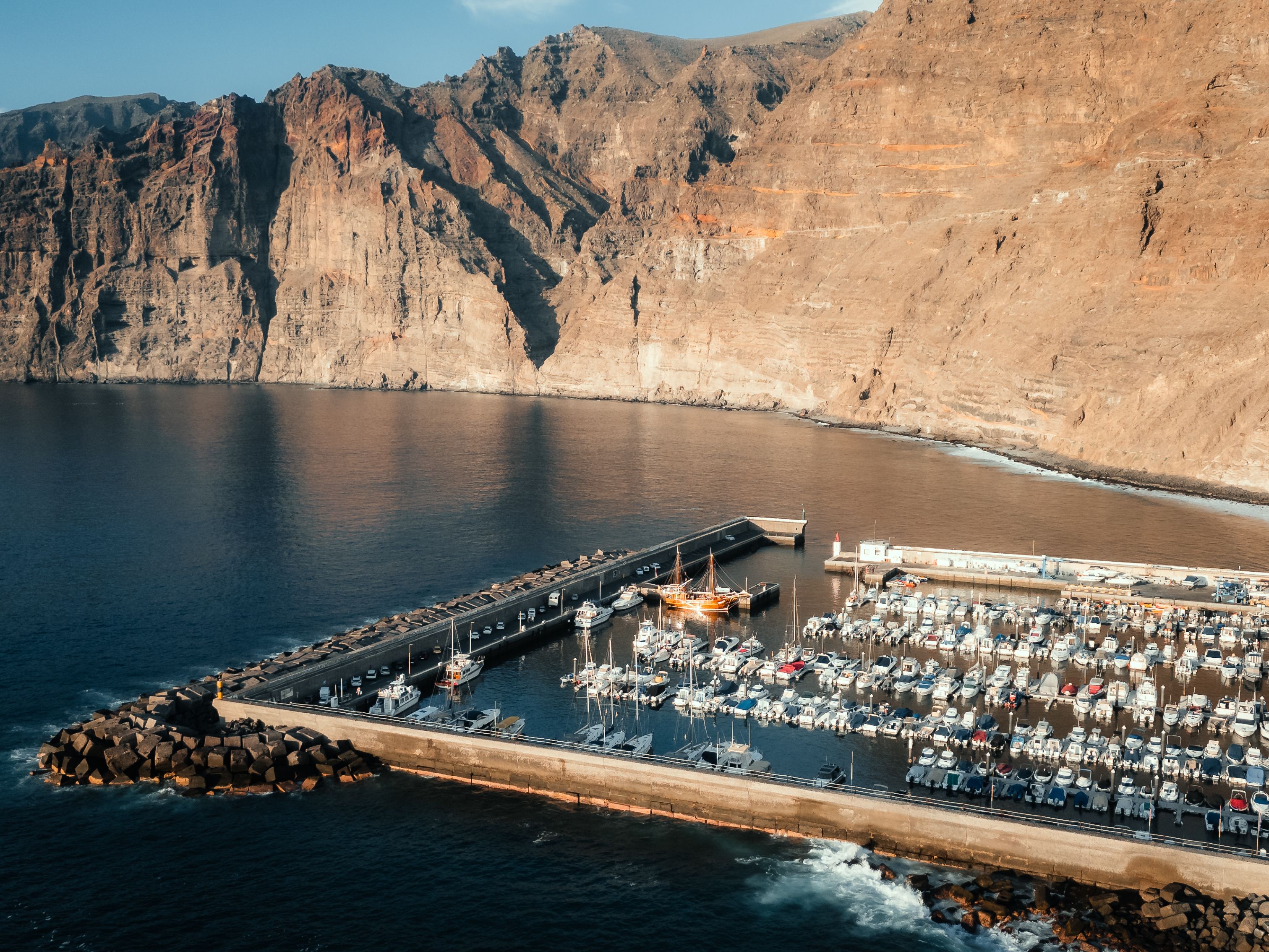 A Stunning View of Los Gigantes Cliffs and Marina · Free Stock Photo