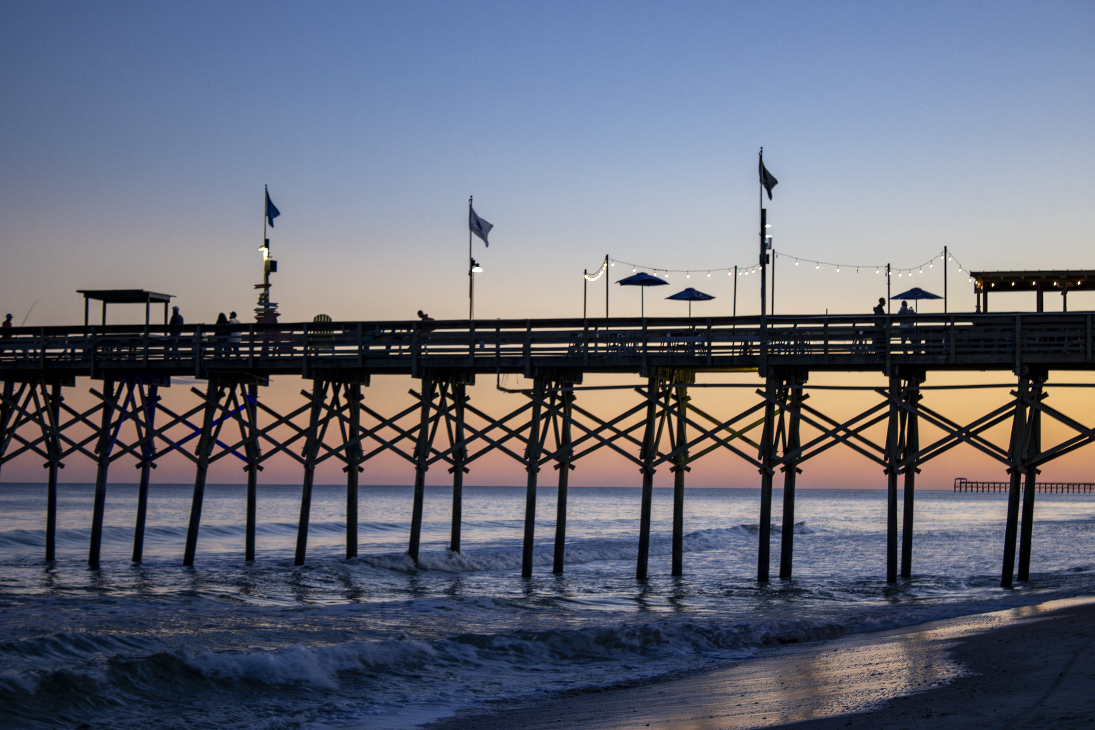 Serene Sunset View at Scenic Fishing Pier · Free Stock Photo