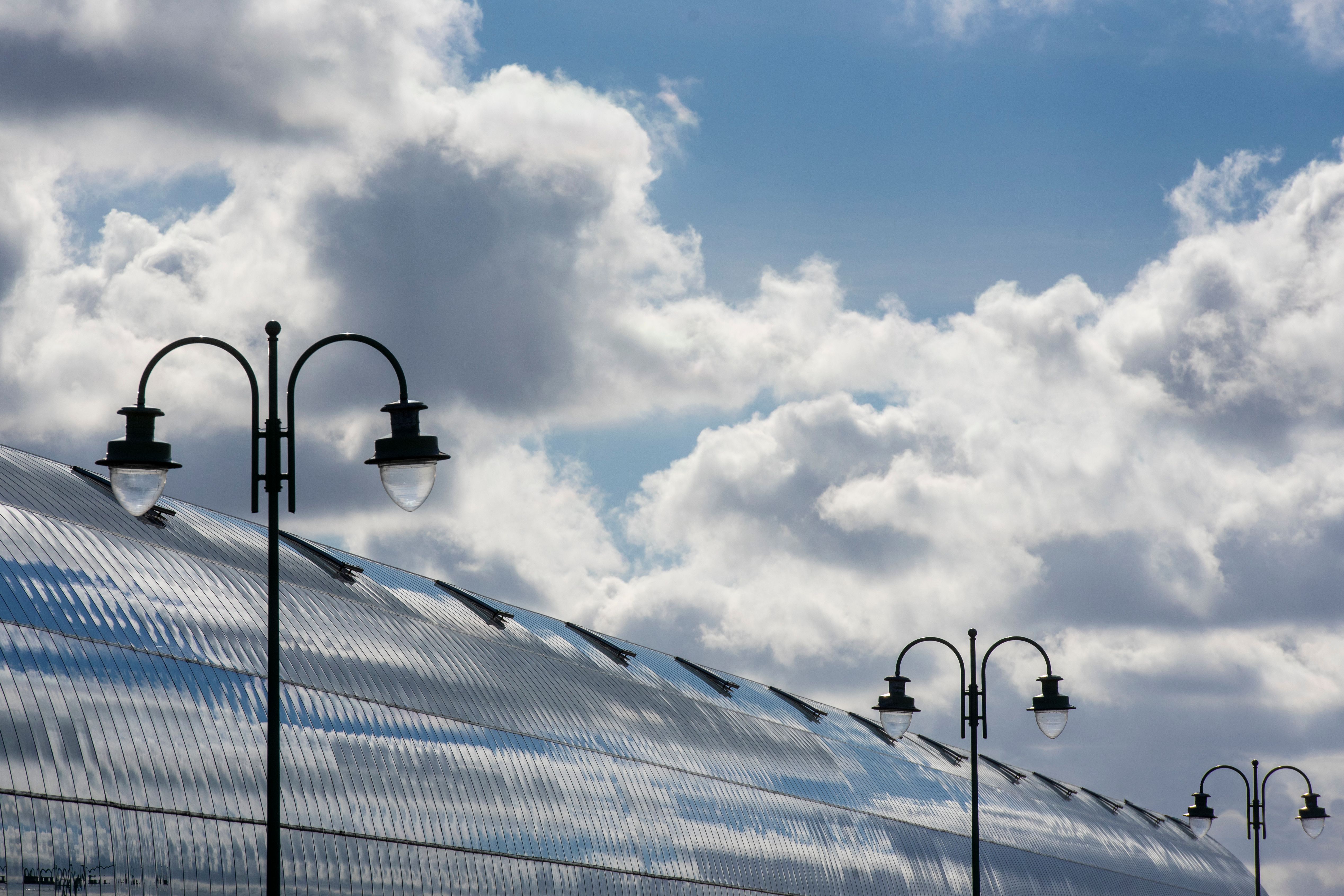 Modern Architectural Roof with Street Lamps · Free Stock Photo