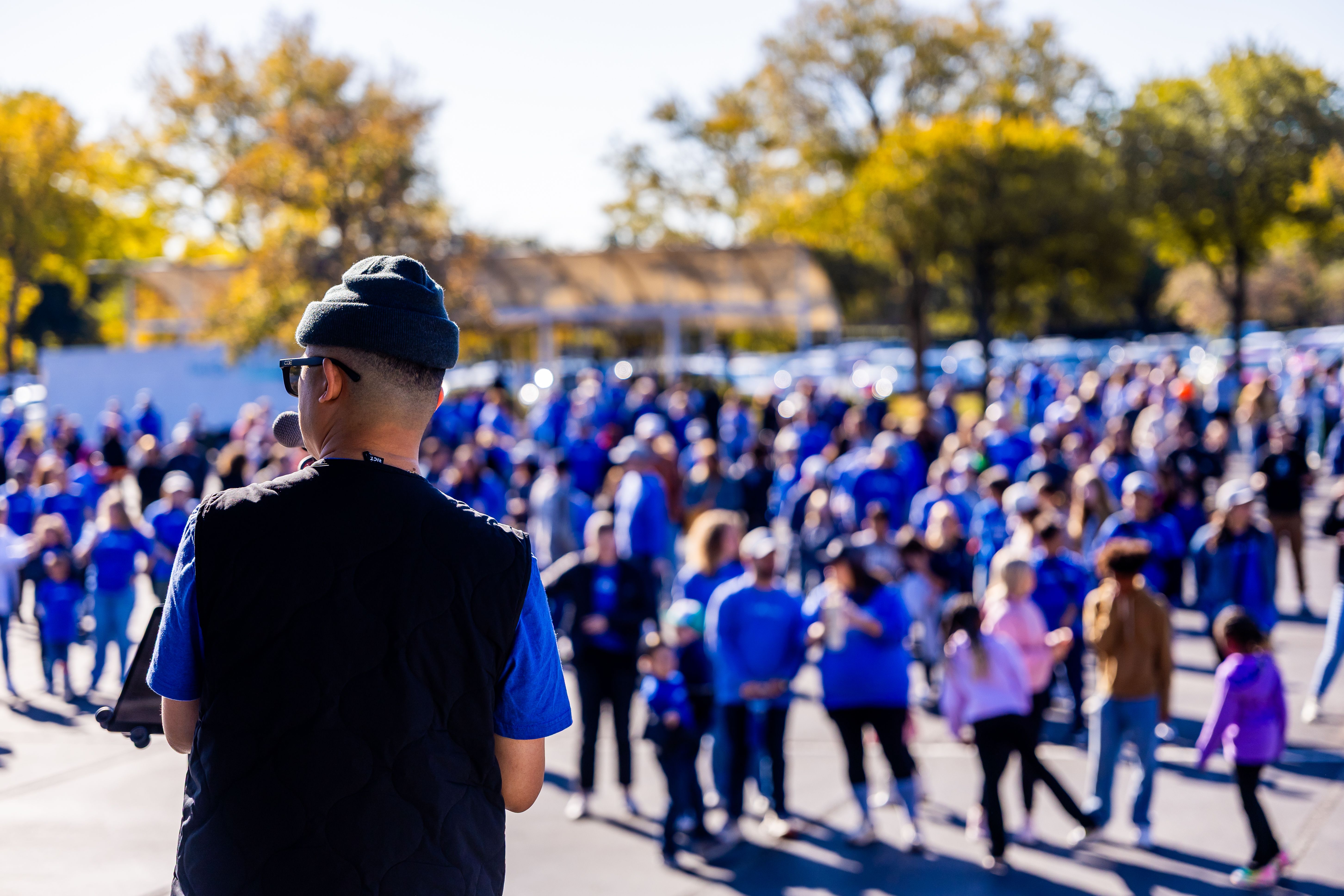 Outdoor Event with Speaker Addressing Crowd at Rally · Free Stock Photo