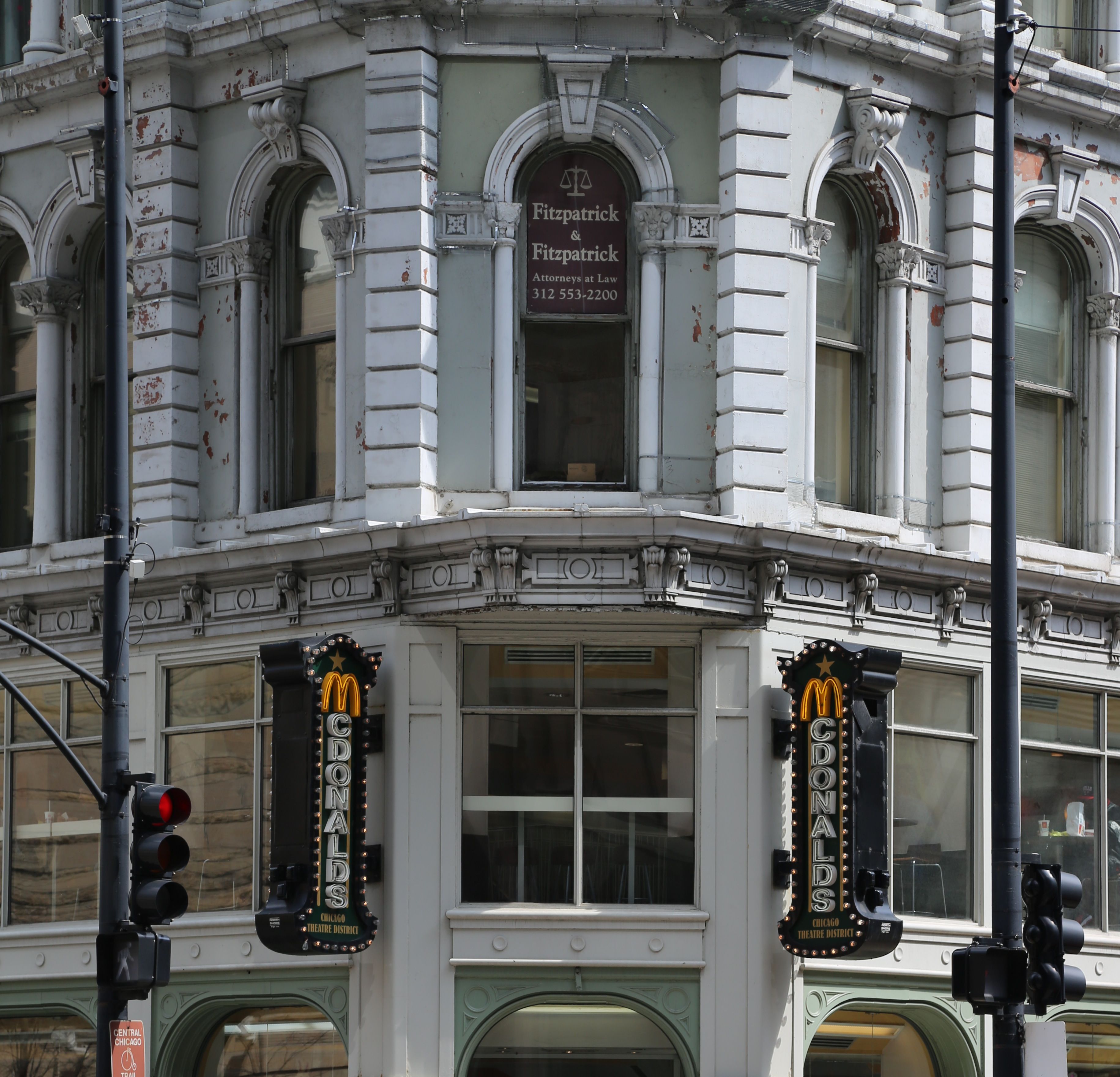 Historic Architecture with Iconic Restaurant Signs · Free Stock Photo