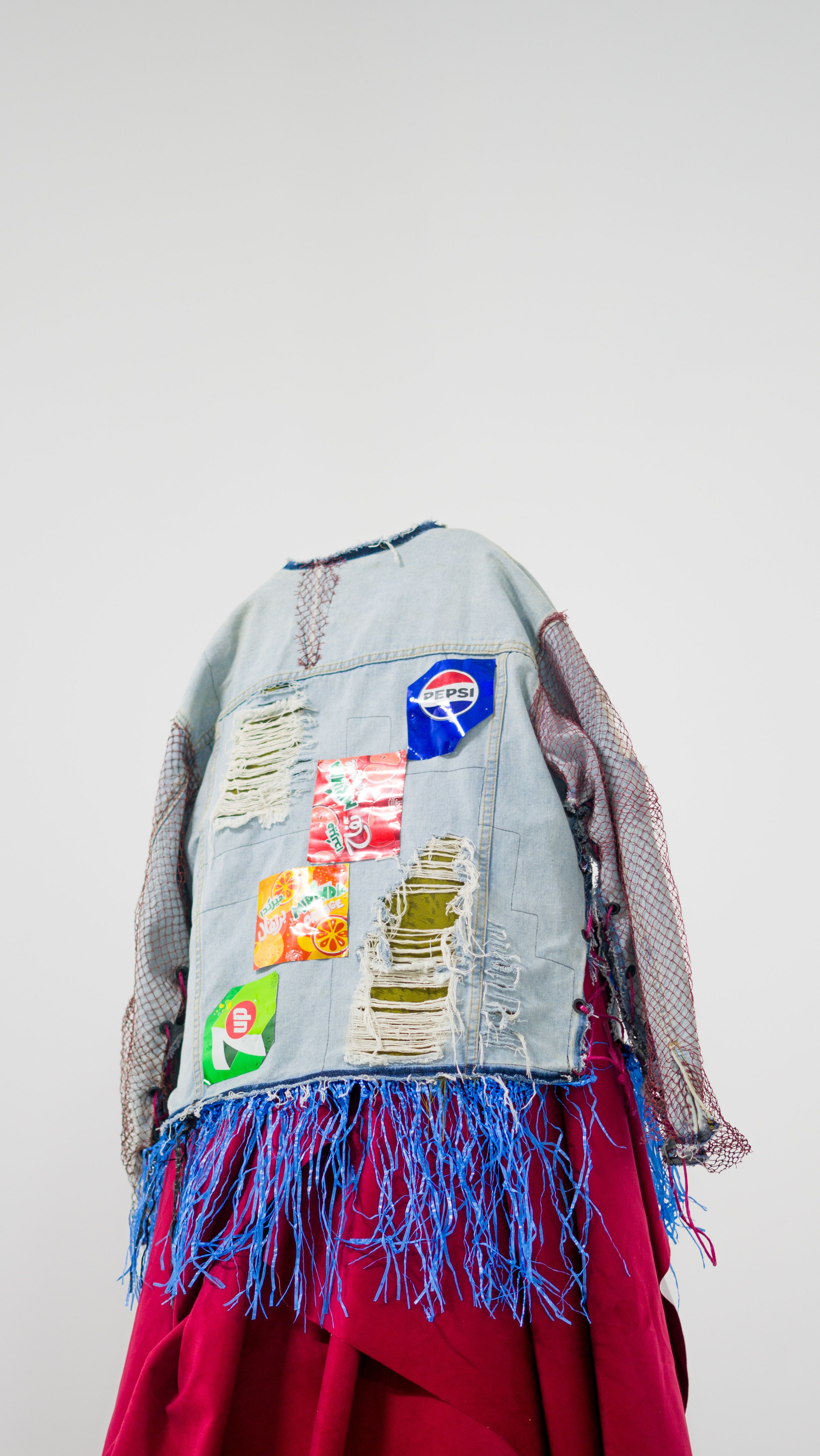 Creative Denim Jacket with Patchwork Design · Free Stock Photo