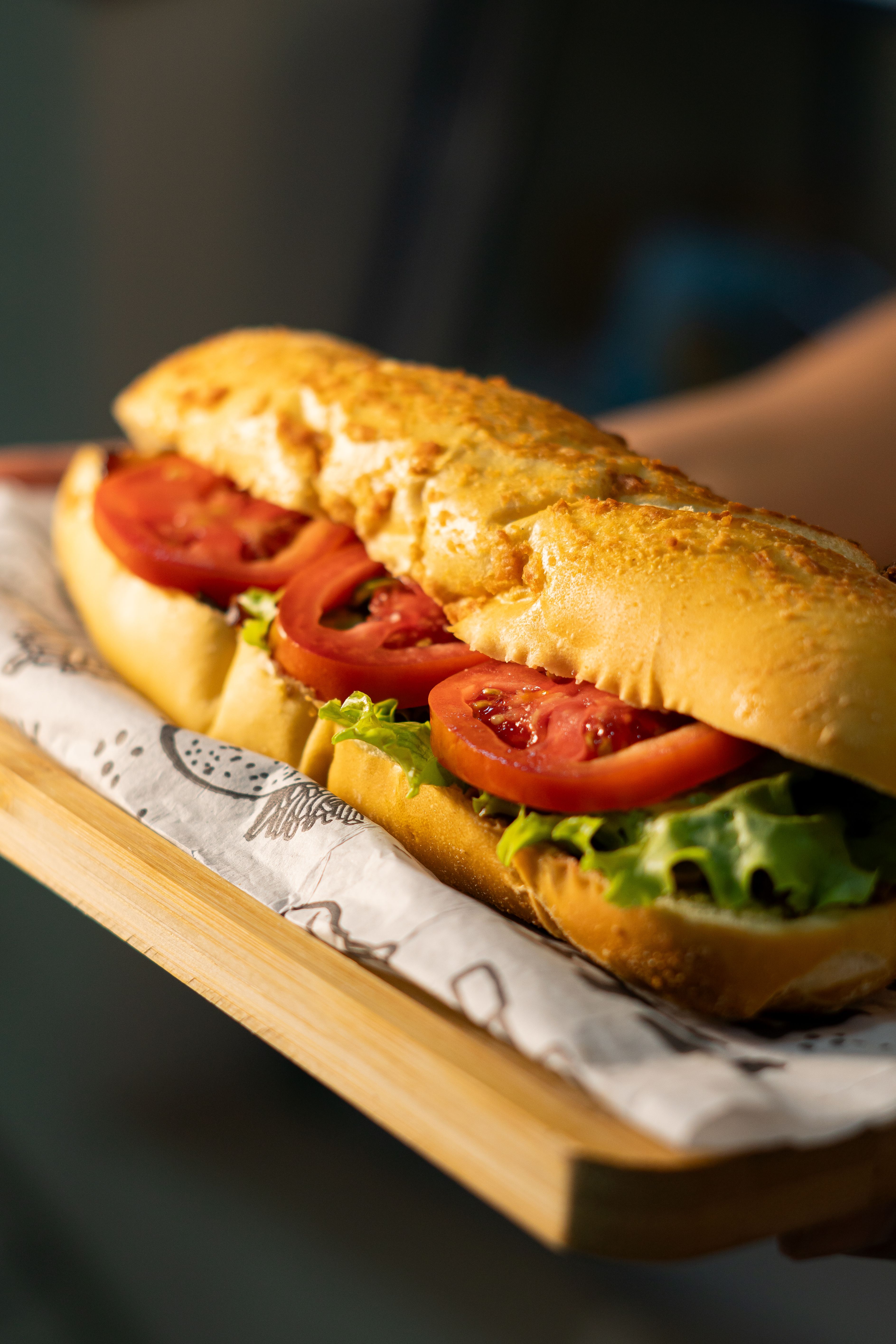 Delicious Sub Sandwich with Fresh Ingredients · Free Stock Photo
