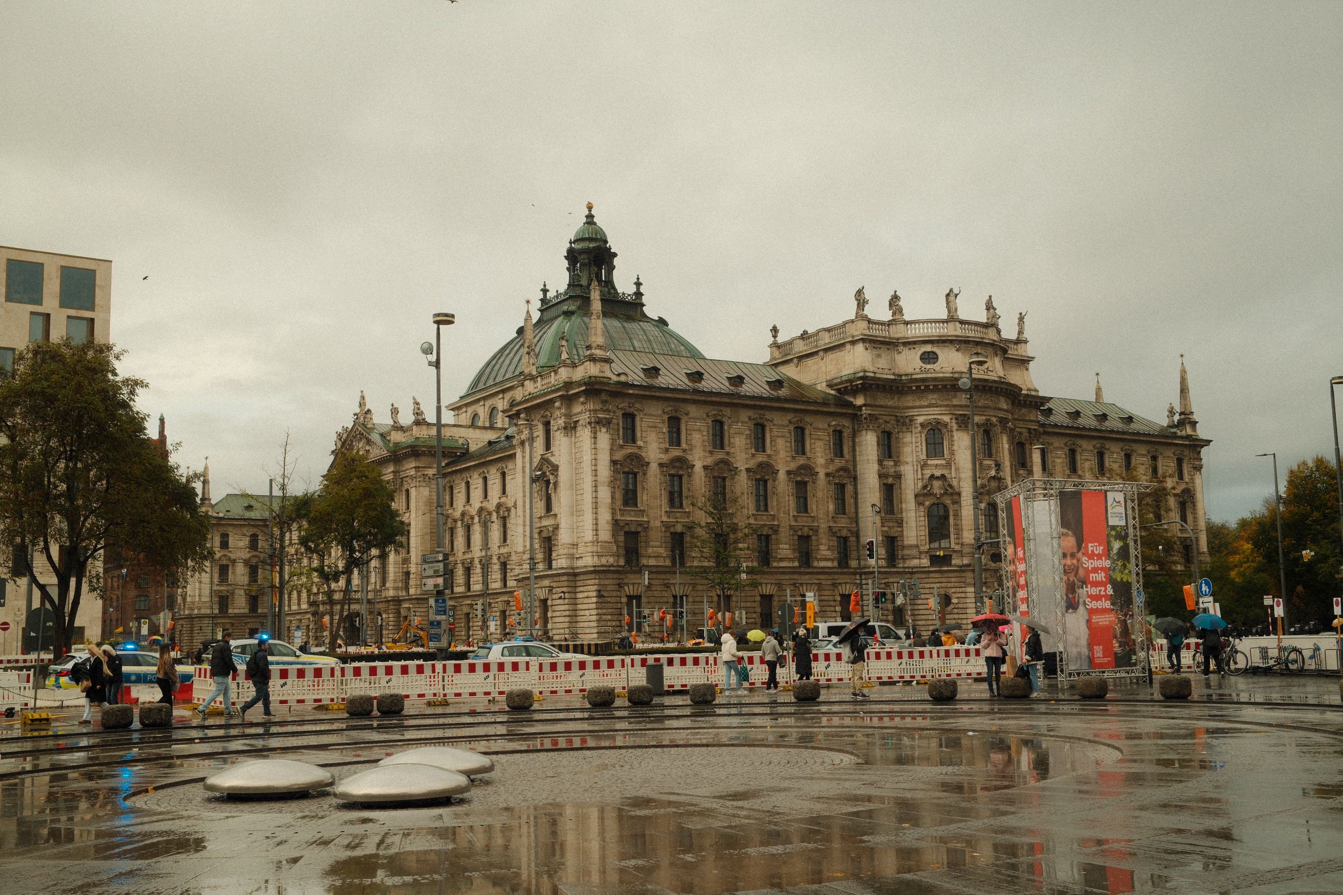 Historic Building in Rainy Munich Street Scene · Free Stock Photo