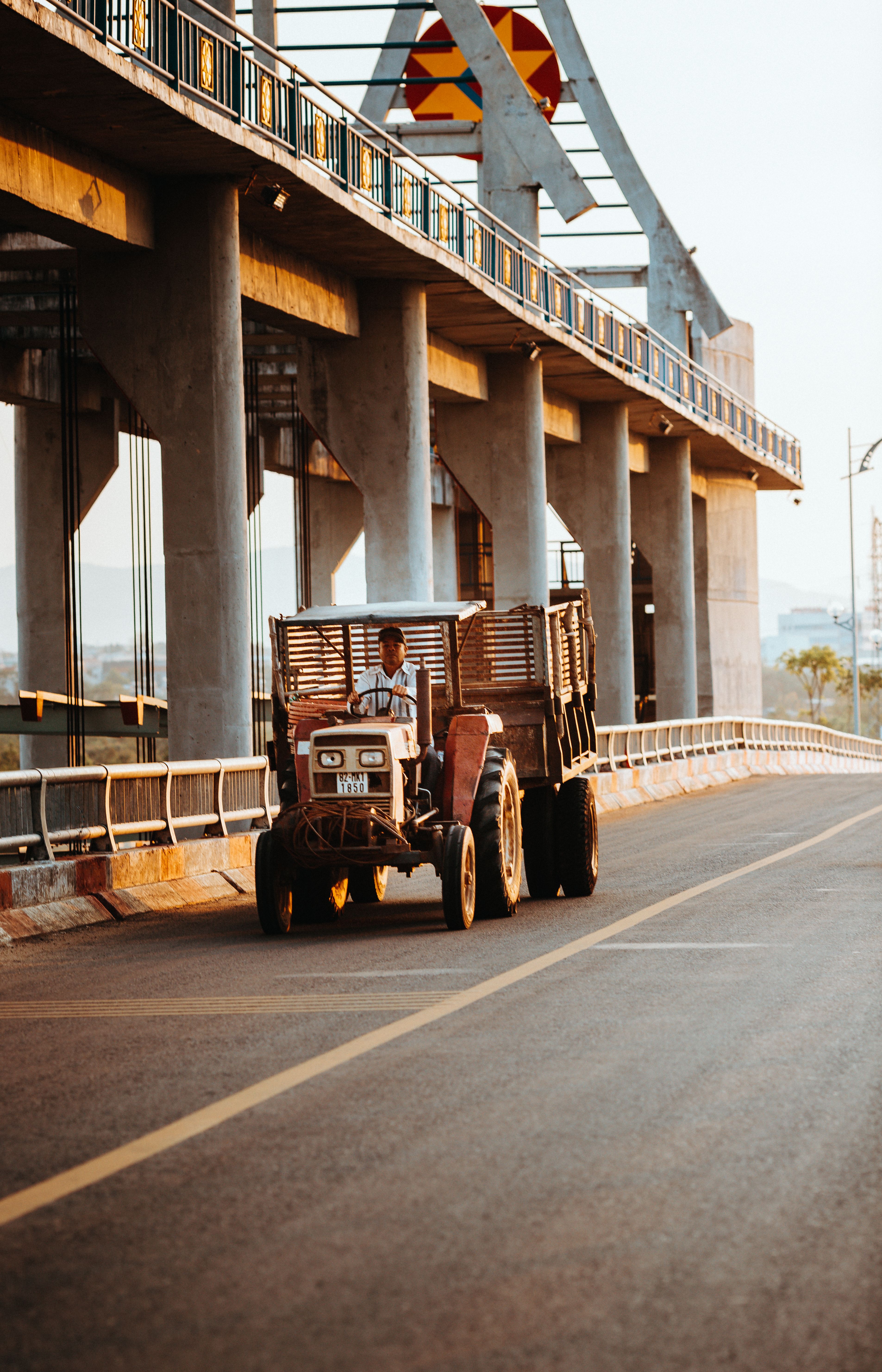 Rural Tractor Crossing Bridge in Kon Tum, Vietnam · Free Stock Photo