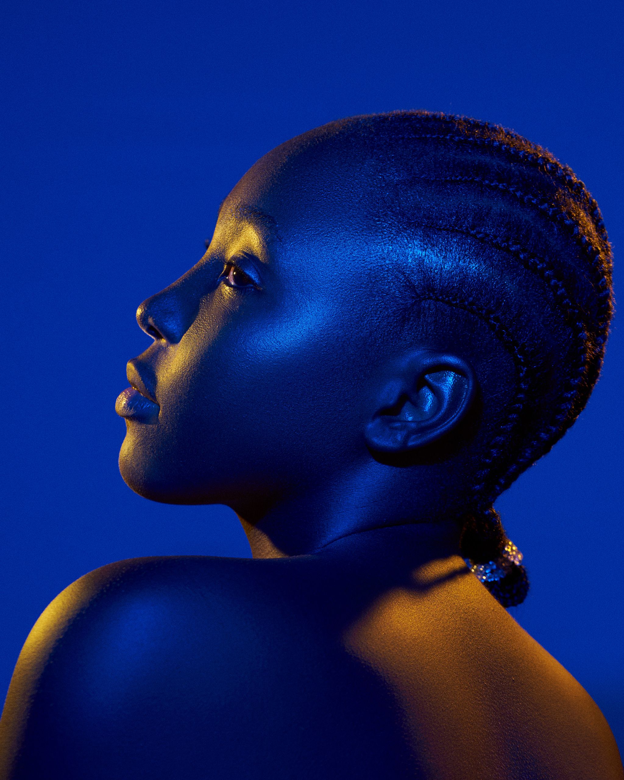 Artistic Profile Portrait in Blue Lighting · Free Stock Photo