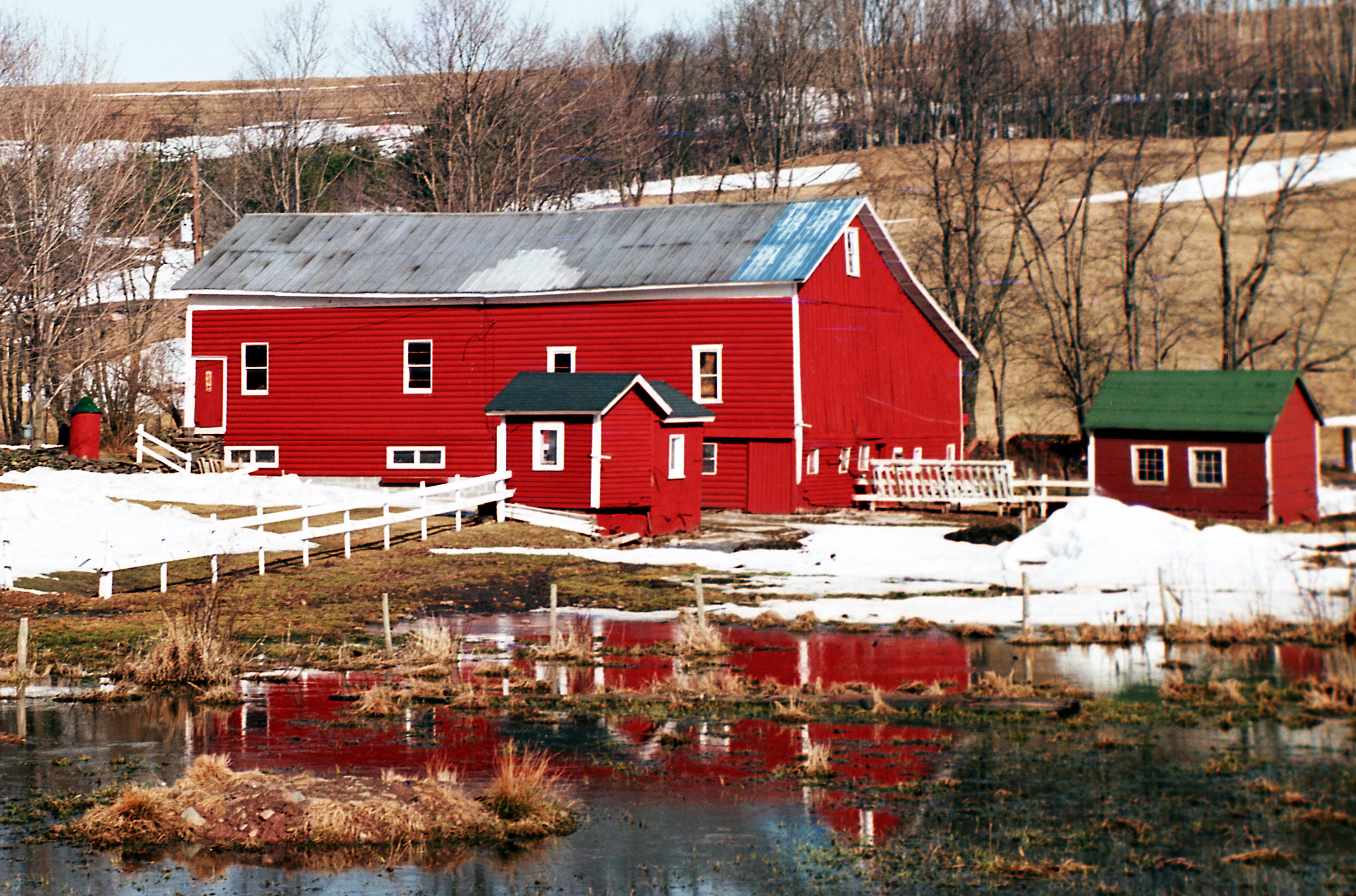Rustic Red Barn in Winter Landscape · Free Stock Photo