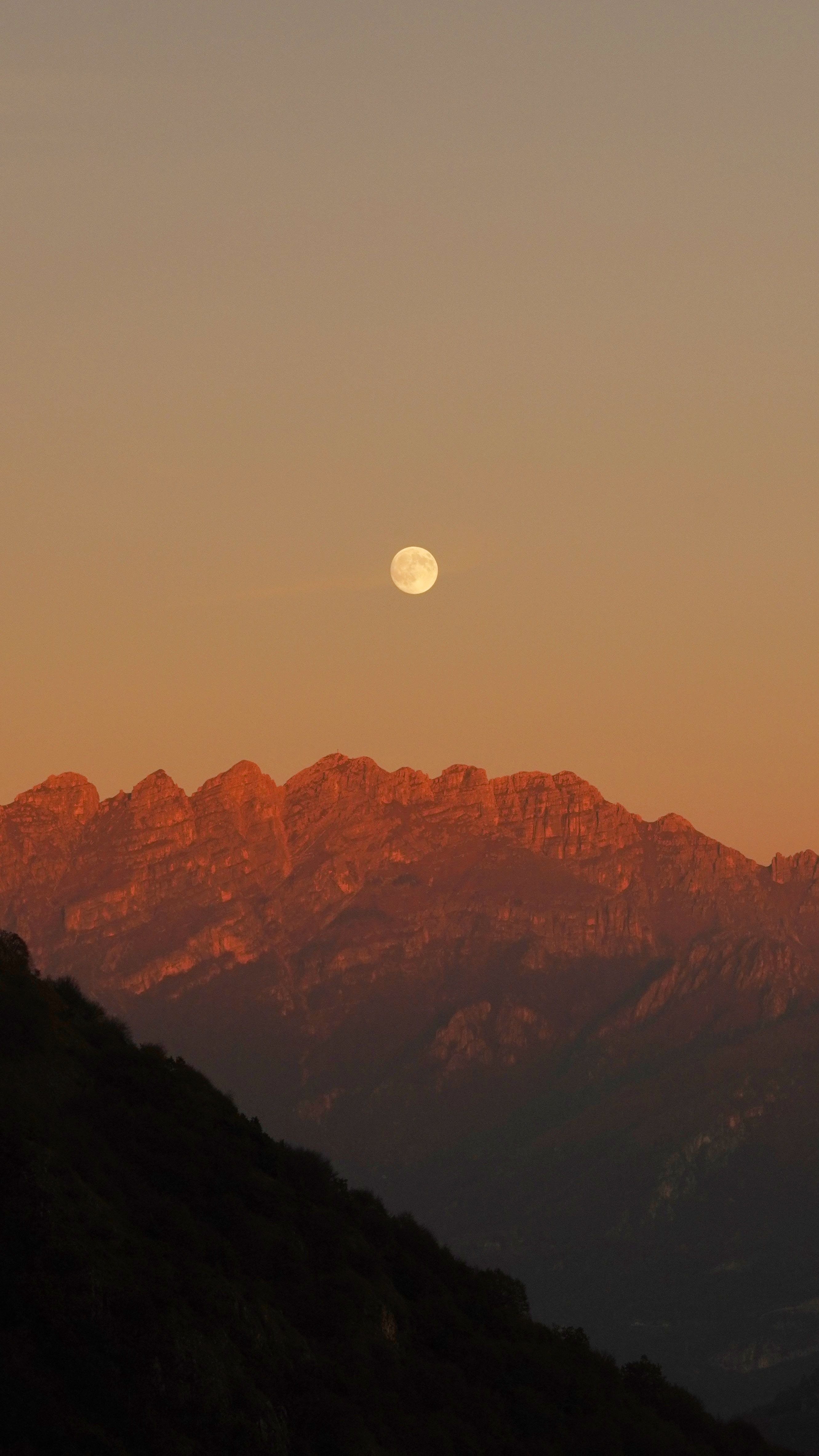 Full Moon Over Mountain at Sunset · Free Stock Photo