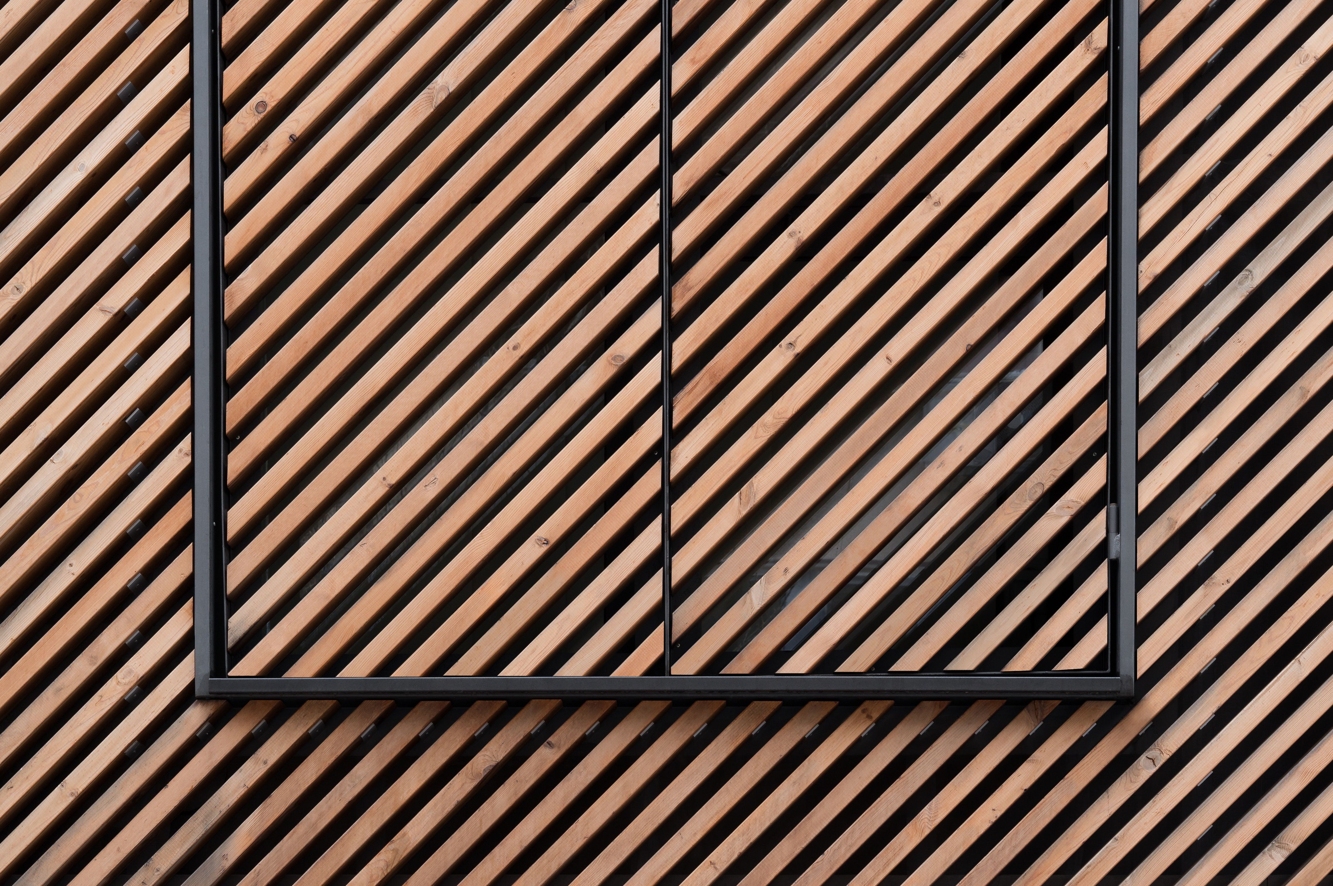 Modern Wooden Wall with Diagonal Pattern and Frame · Free Stock Photo