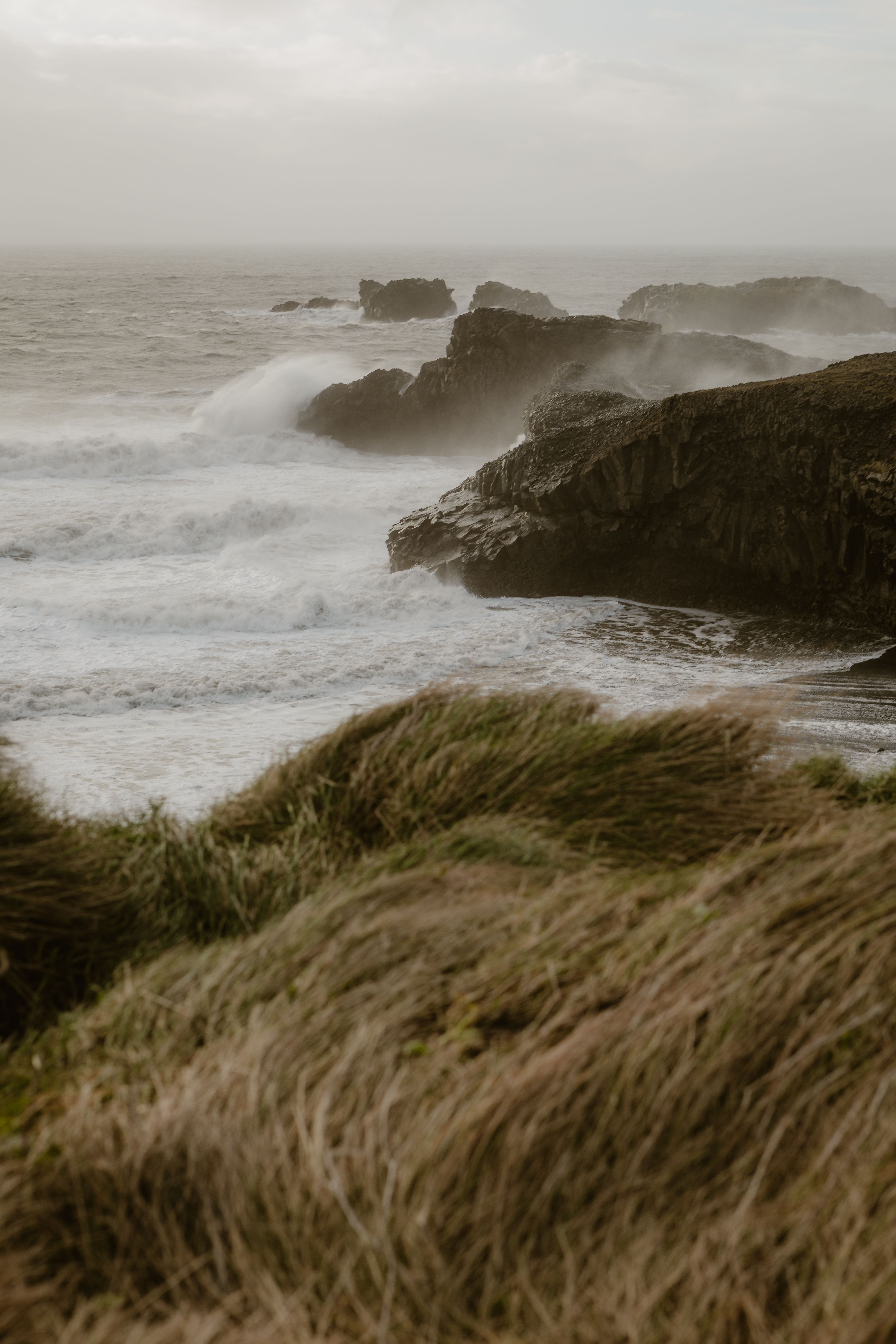 Dramatic Coastal Cliffs with Crashing Waves · Free Stock Photo