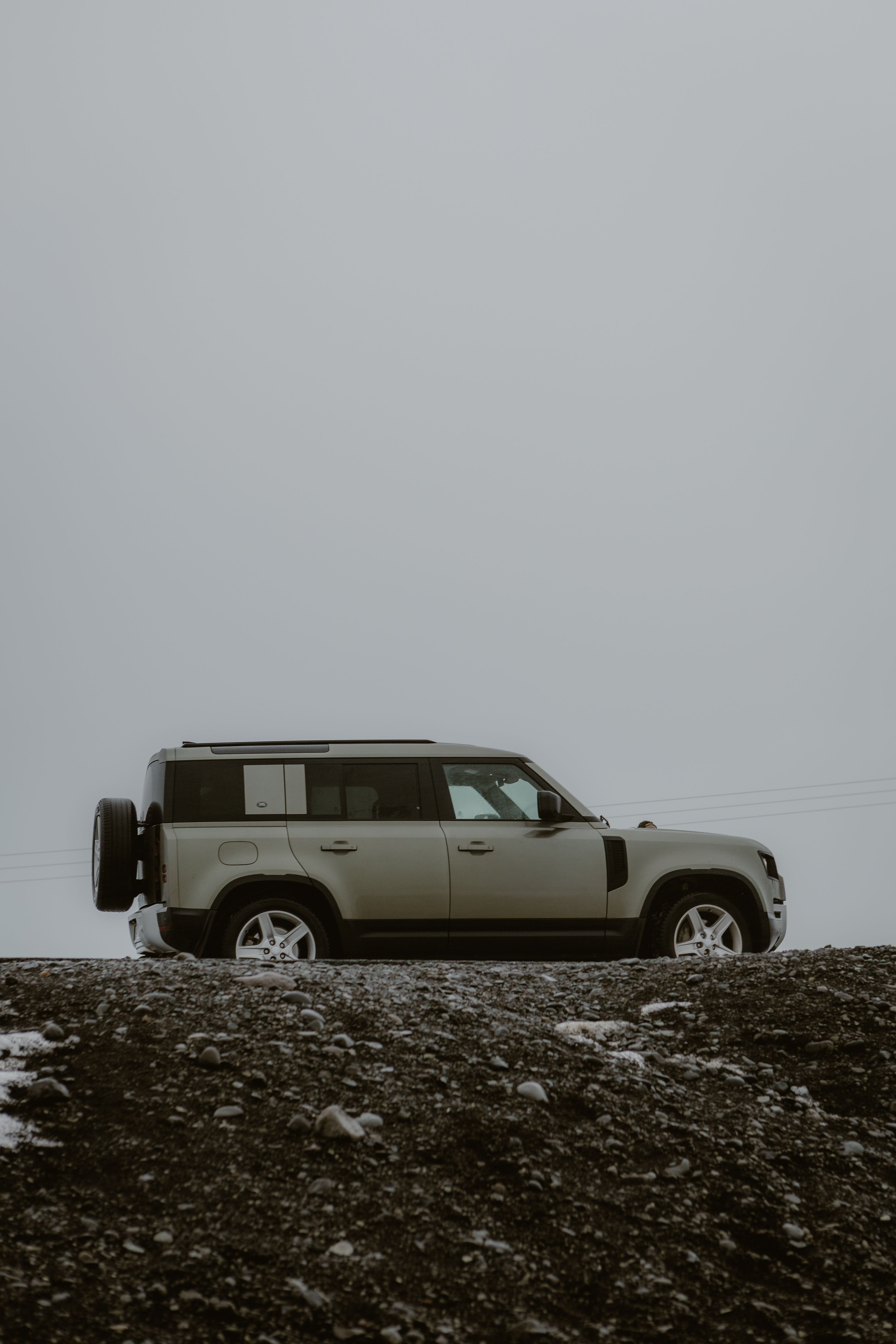 Off-Road Adventure with SUV in Foggy Terrain · Free Stock Photo