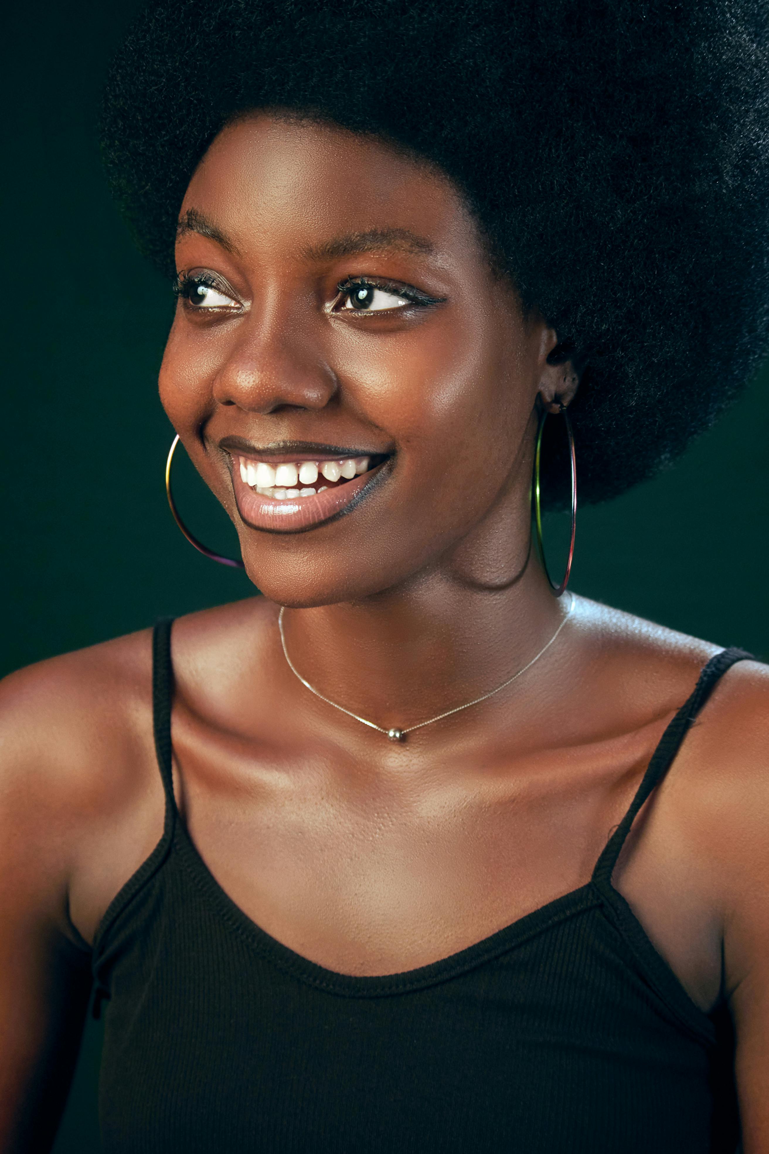 Portrait of Smiling Woman with Afro Hairstyle · Free Stock Photo