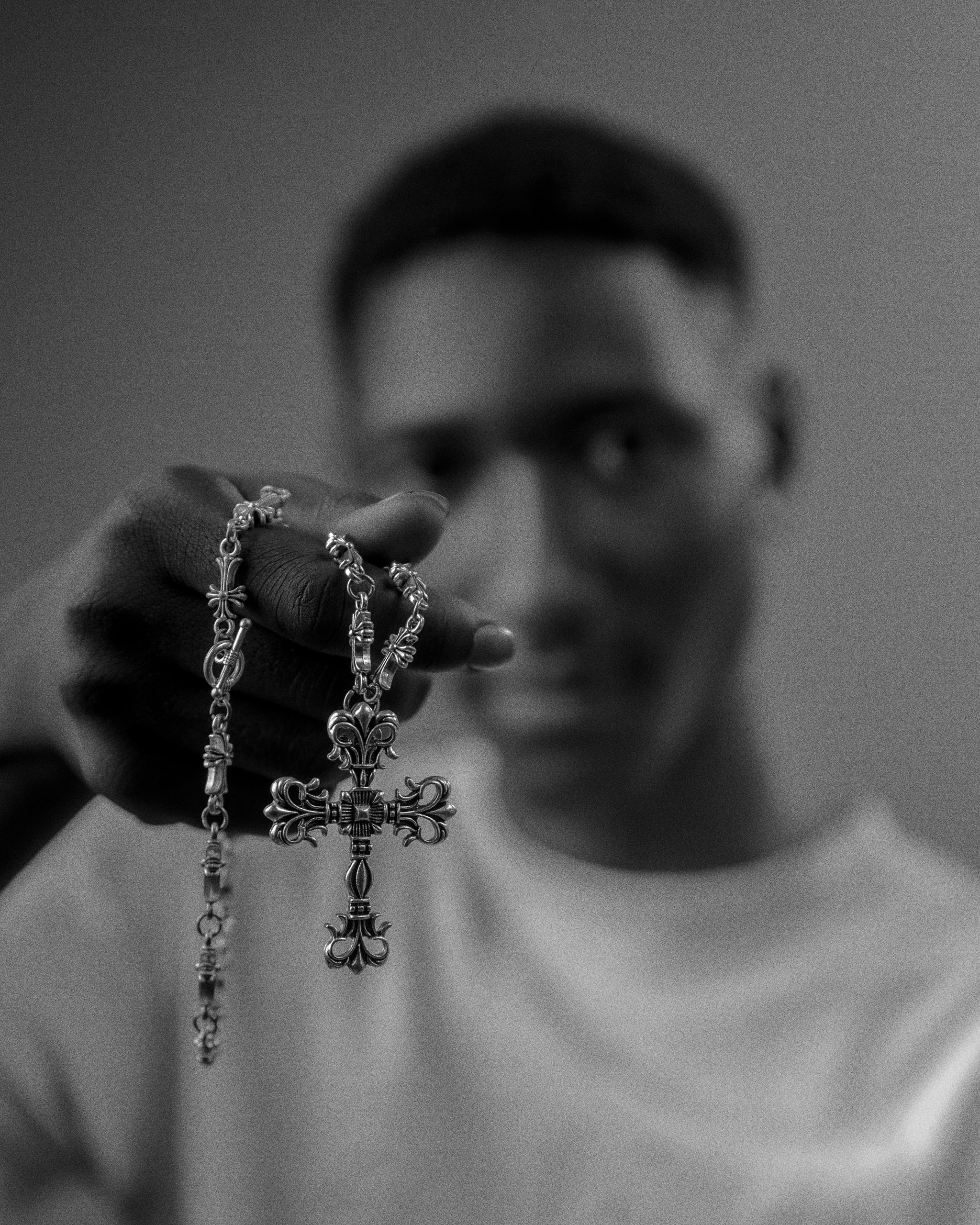 Black and White Portrait with Cross Necklace · Free Stock Photo