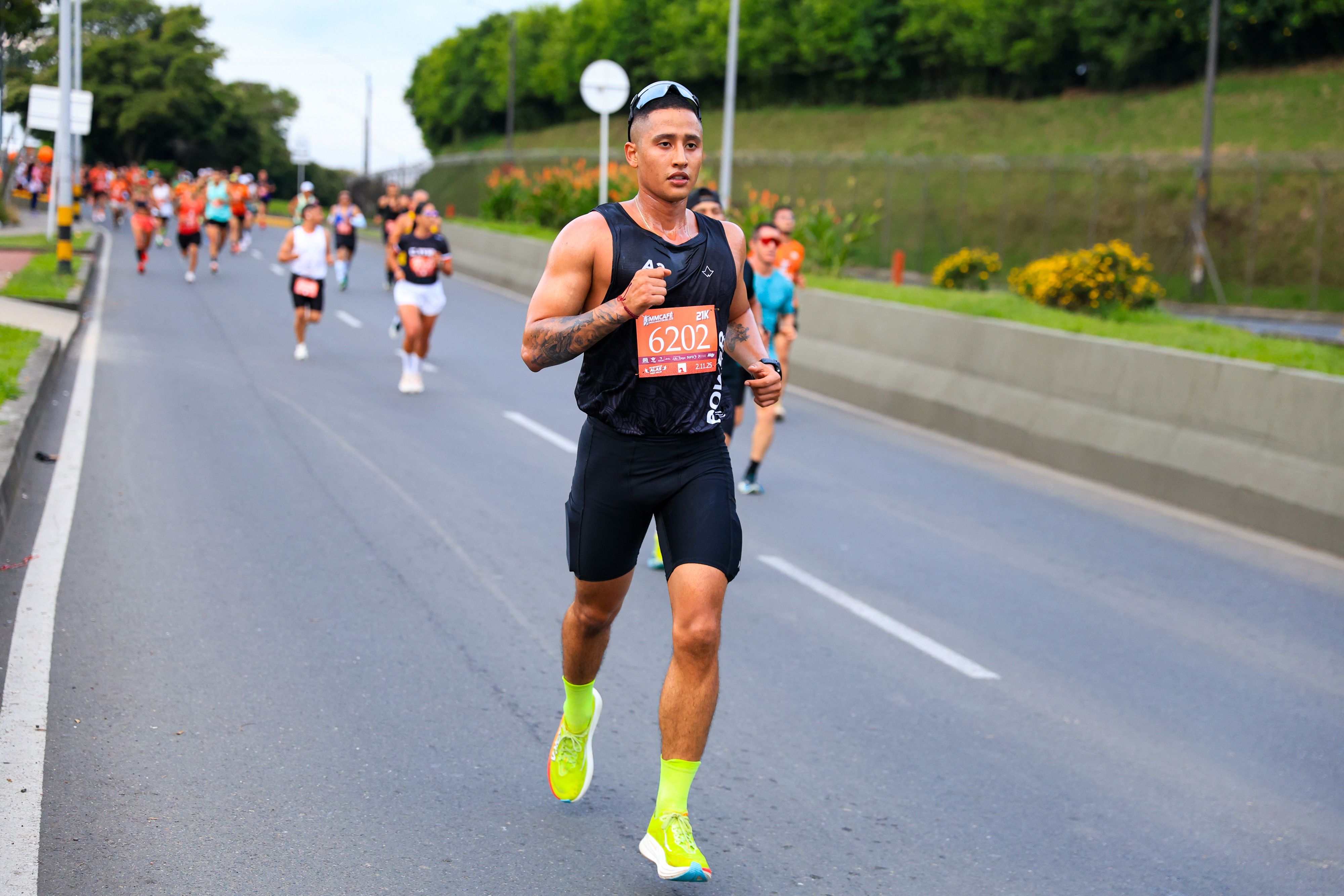 Male Athlete Competing in Outdoor Marathon Race · Free Stock Photo