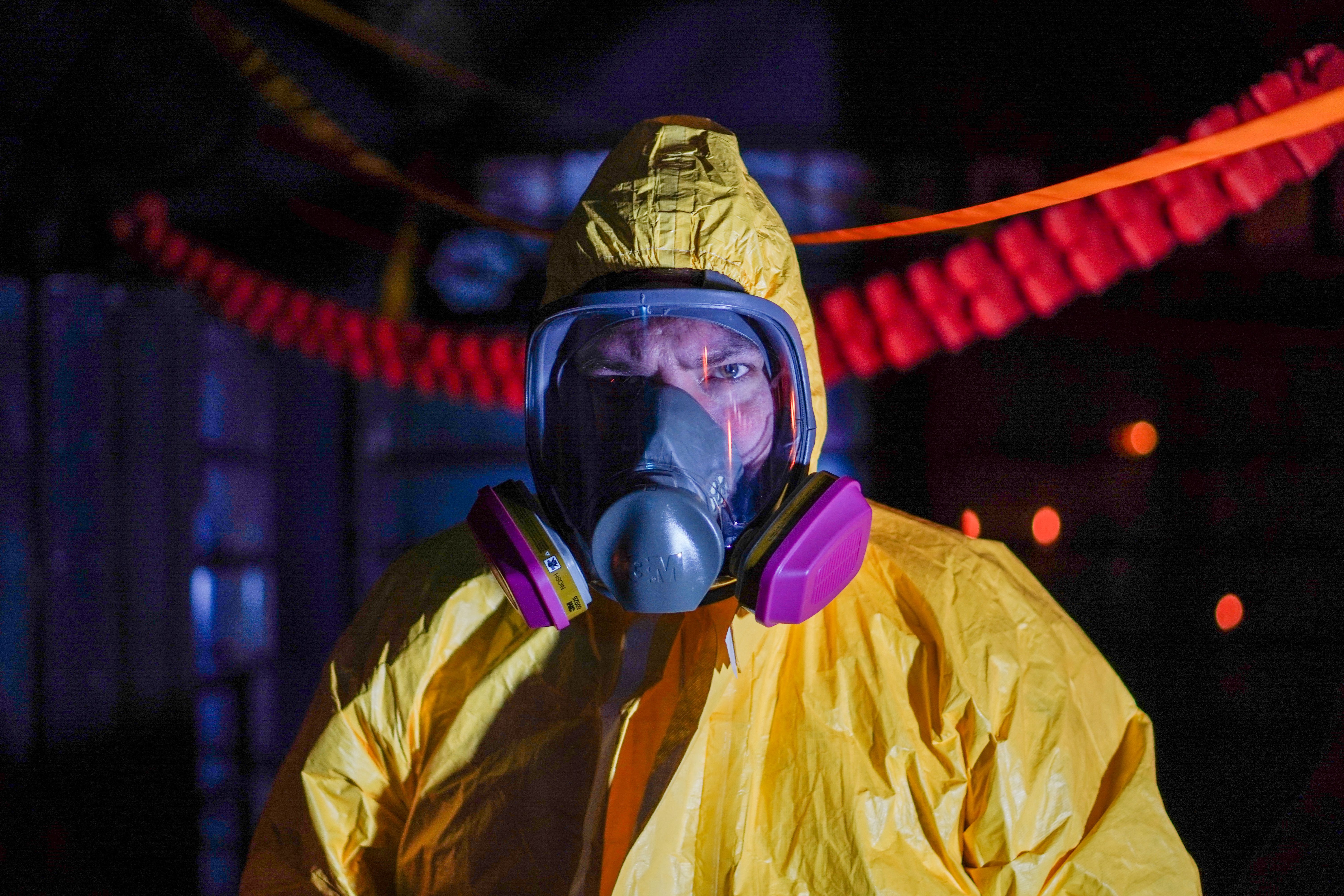 Person in Protective Gear in Contaminated Zone · Free Stock Photo