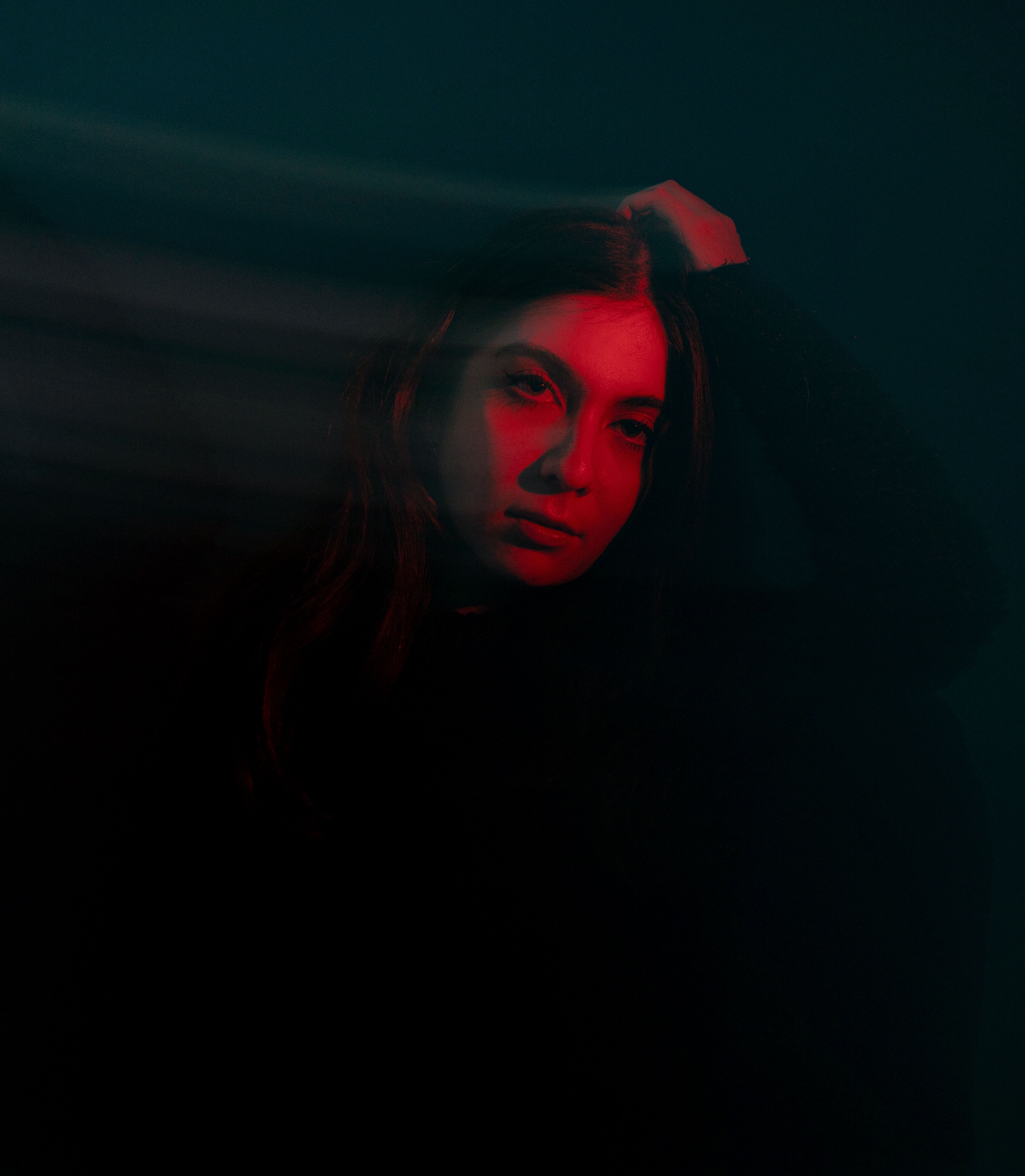 Moody Portrait with Dramatic Red Lighting · Free Stock Photo
