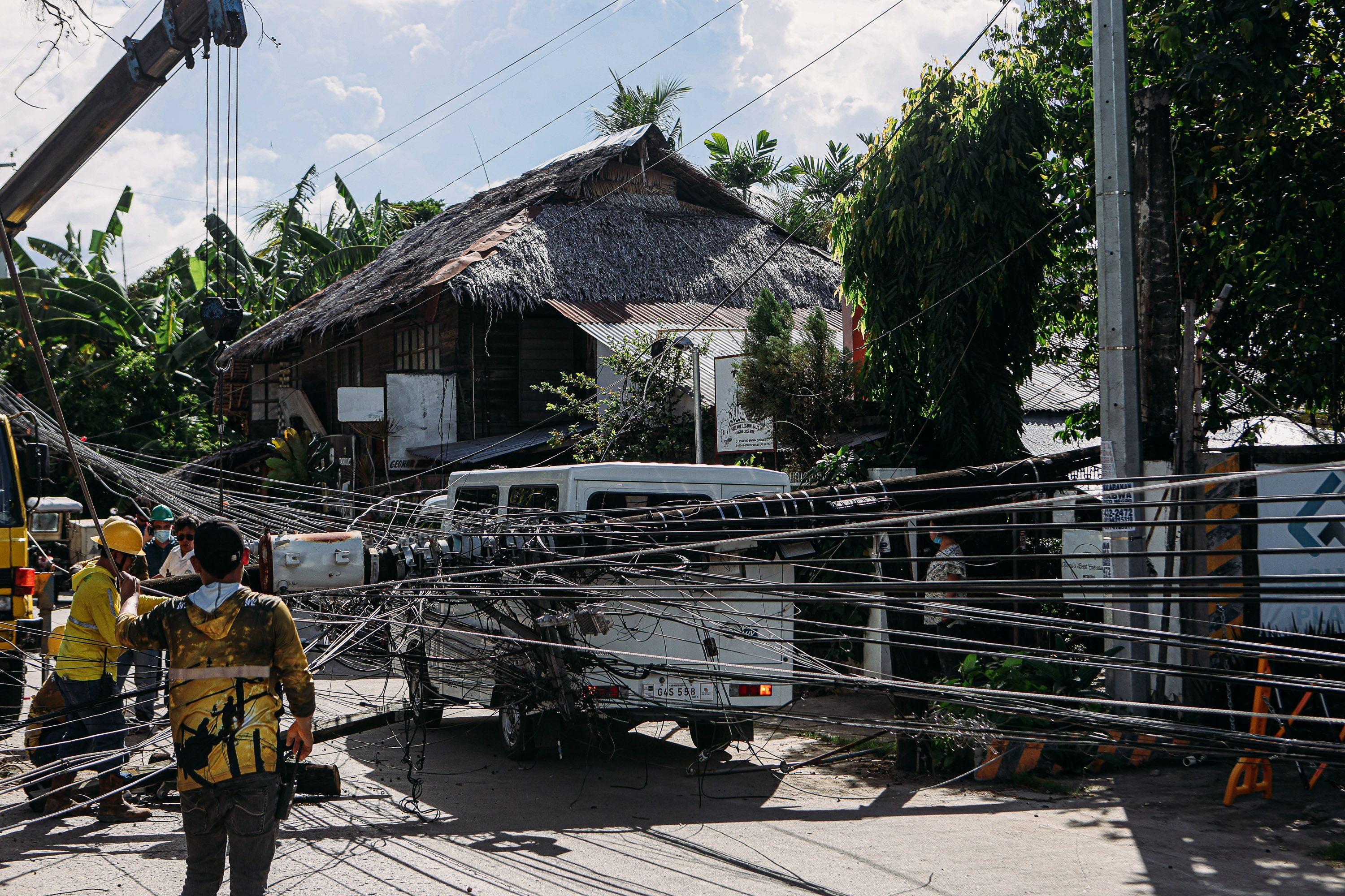 Utility Workers Repairing Damaged Power Lines · Free Stock Photo