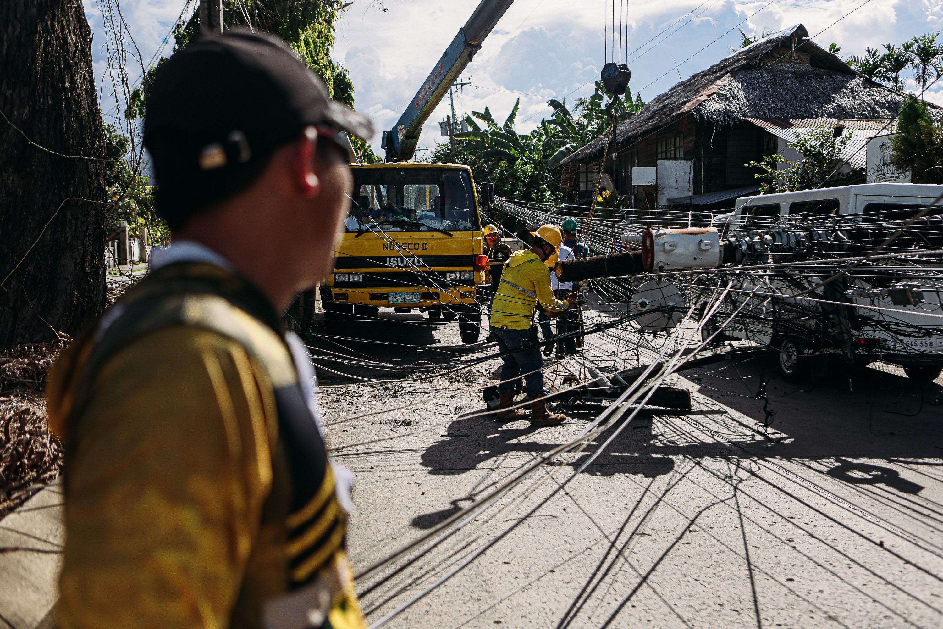 Utility Workers Repairing Damaged Power Lines · Free Stock Photo