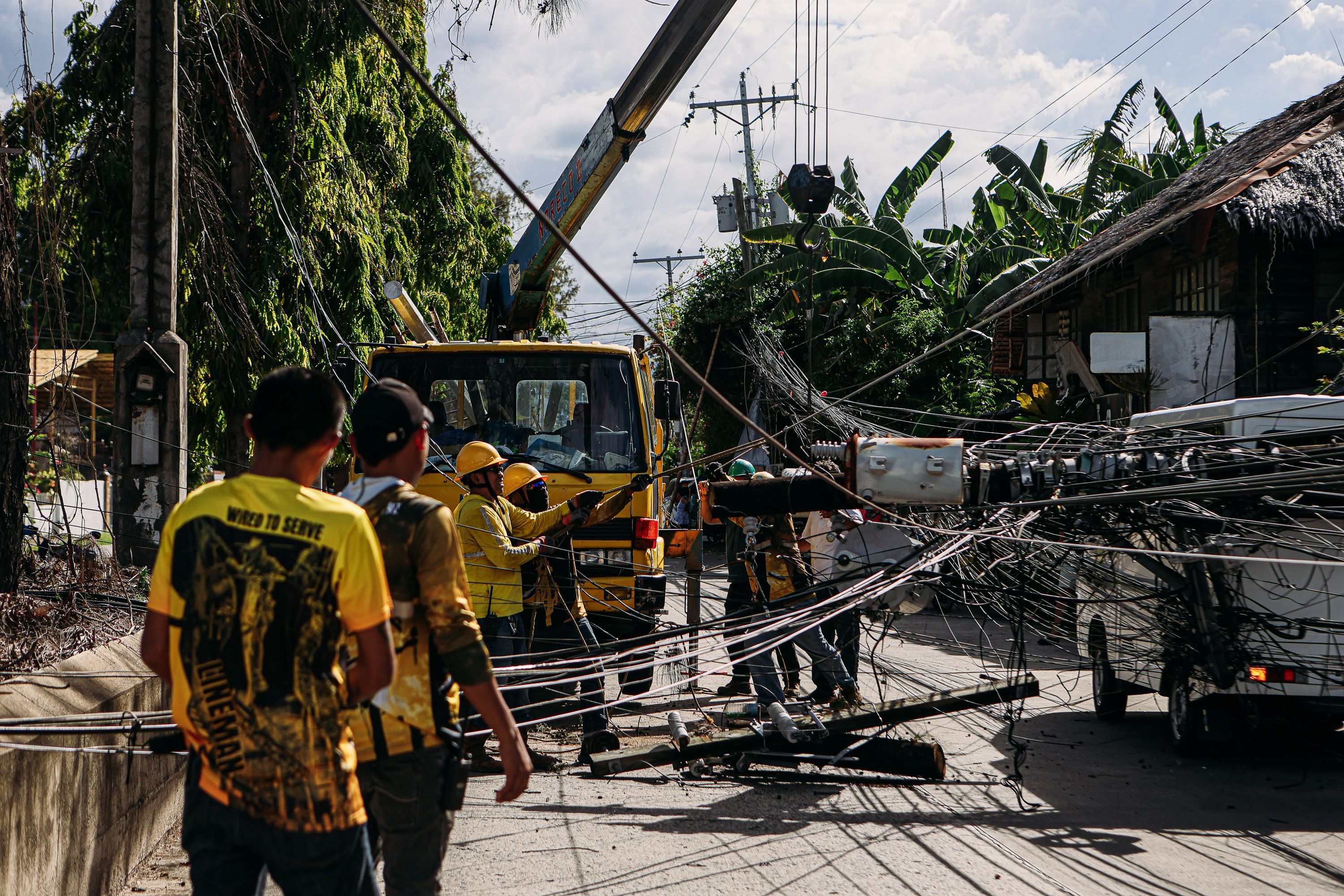 Utility Workers Repairing Damaged Power Lines · Free Stock Photo