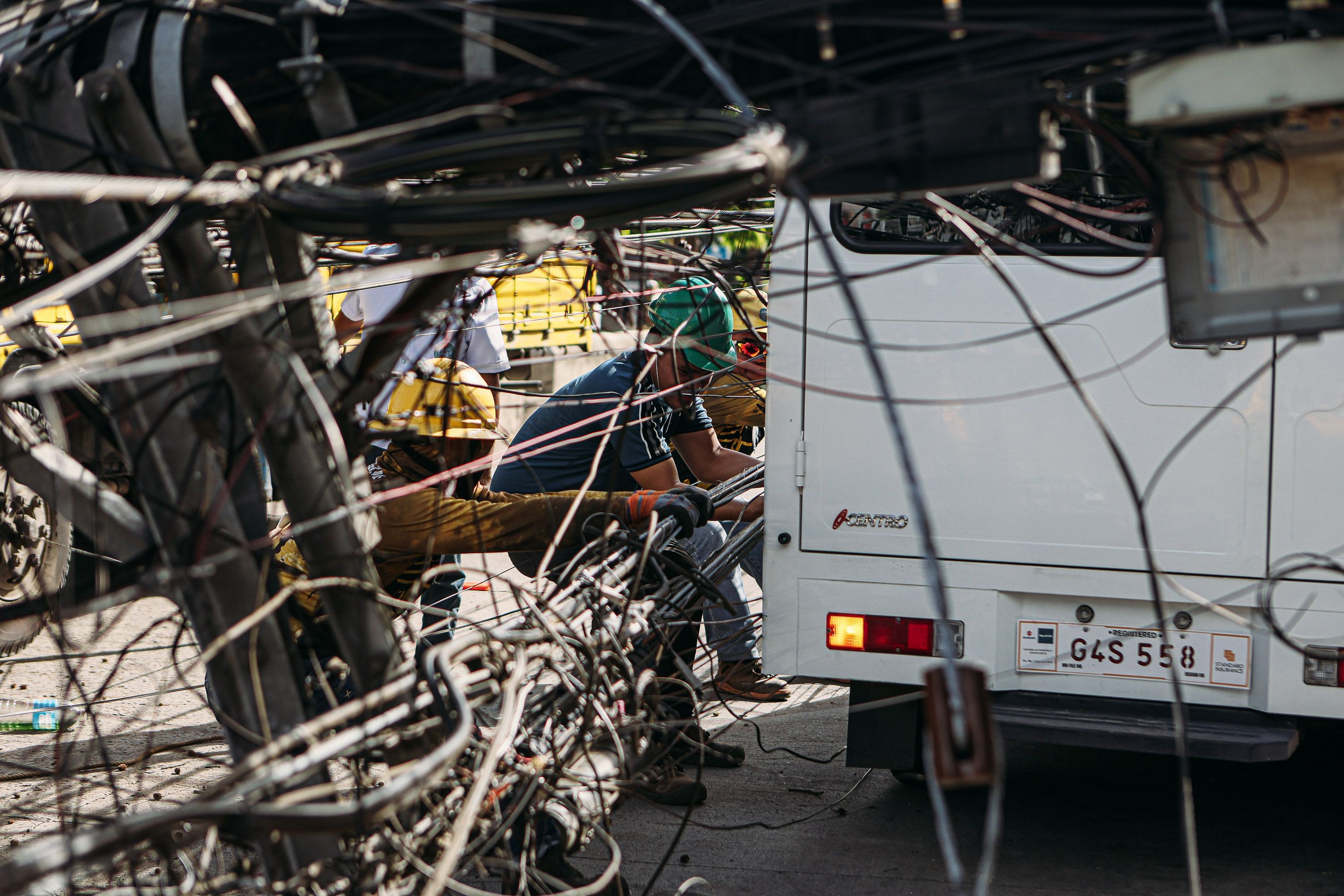 Technicians Repairing Damaged Overhead Wires · Free Stock Photo
