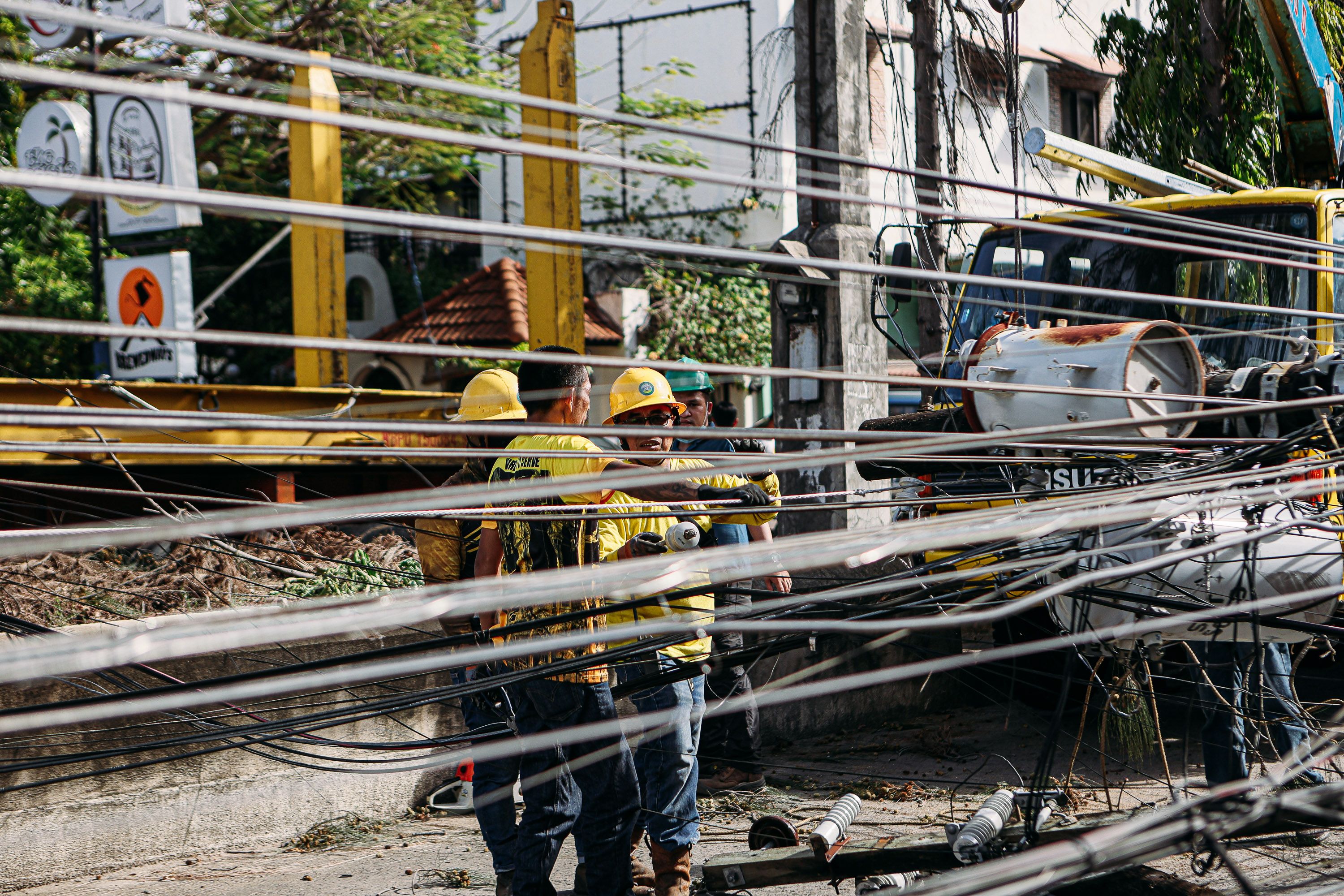Utility Workers Repairing Downed Power Lines · Free Stock Photo