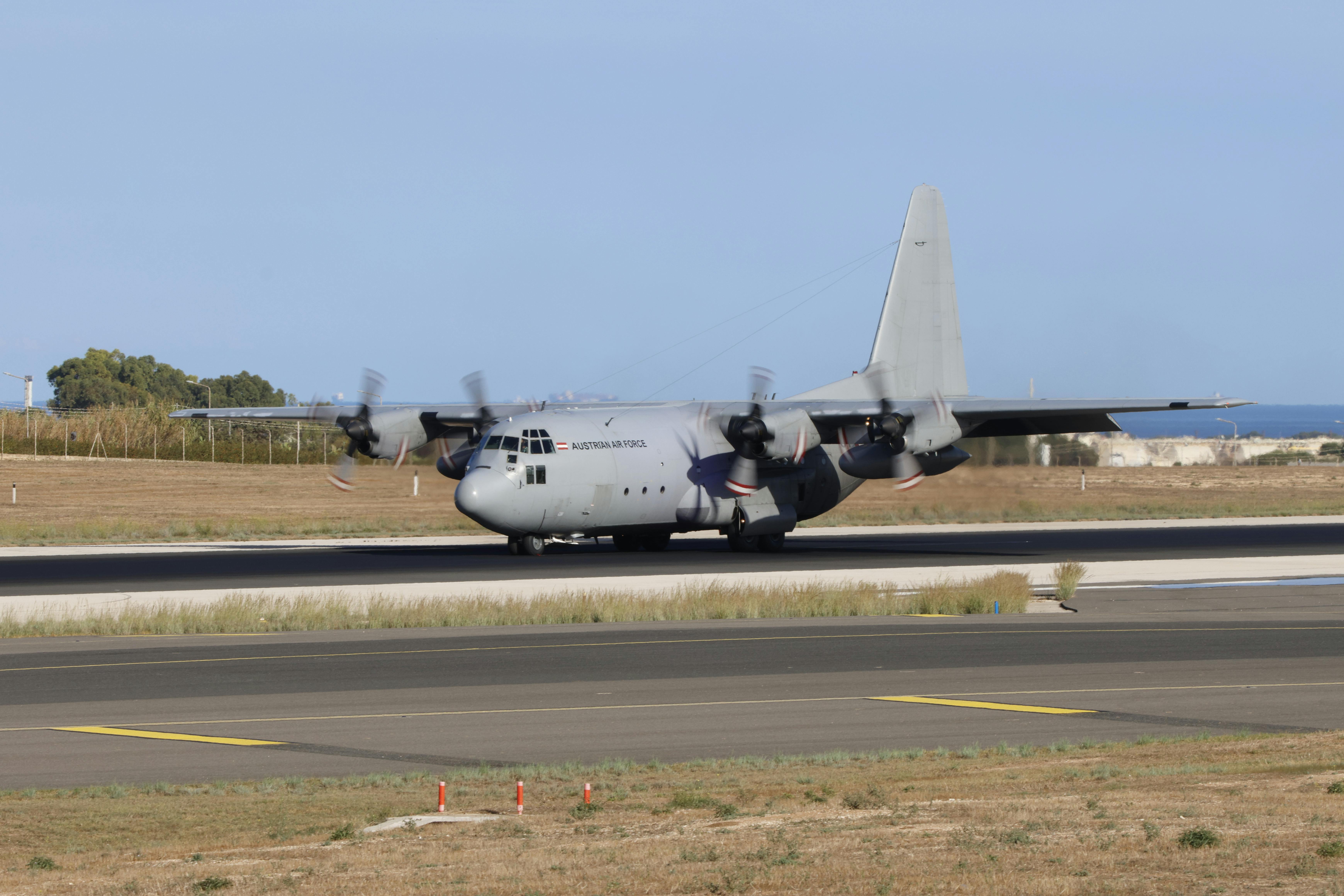 Austrian Air Force Lockheed C-130 Hercules on Runway · Free Stock Photo