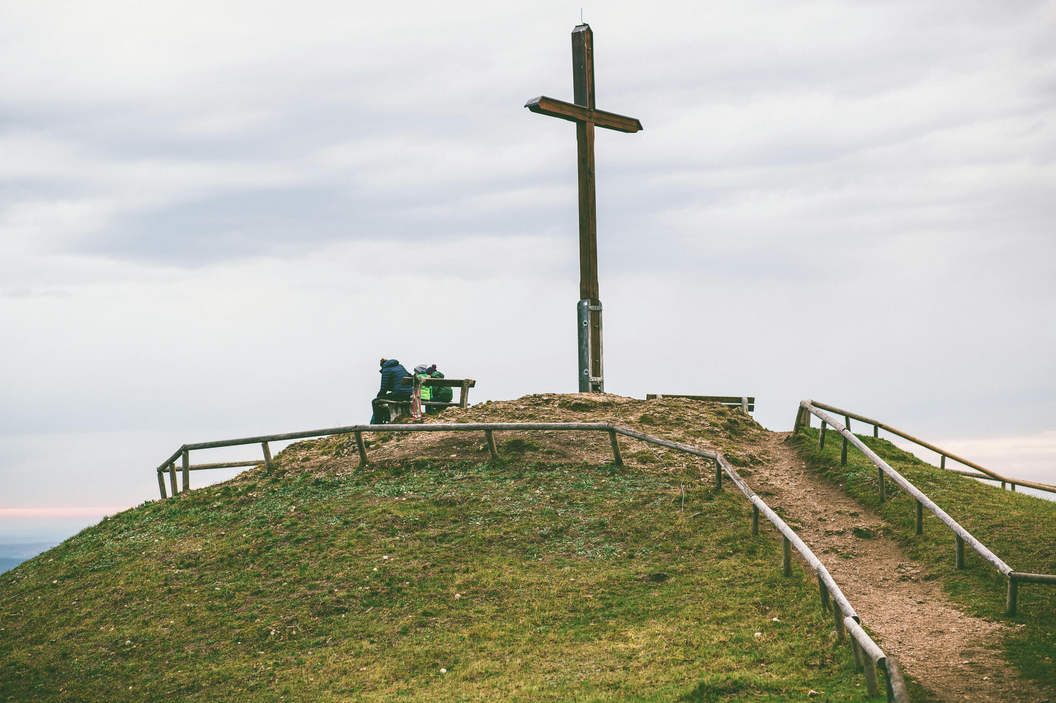 Cross on Hill With Fence · Free Stock Photo