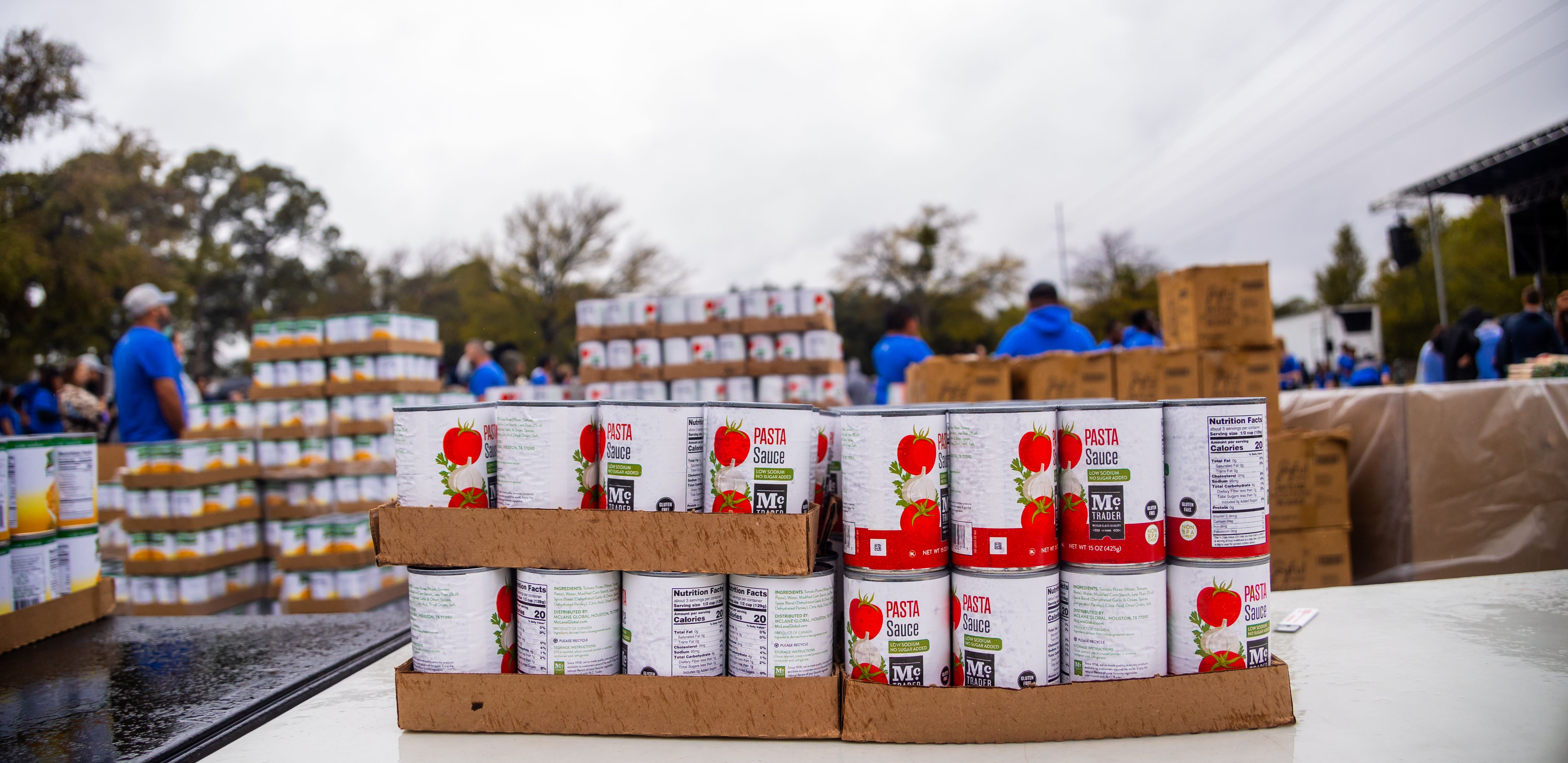 Community Food Drive Distributing Canned Goods · Free Stock Photo