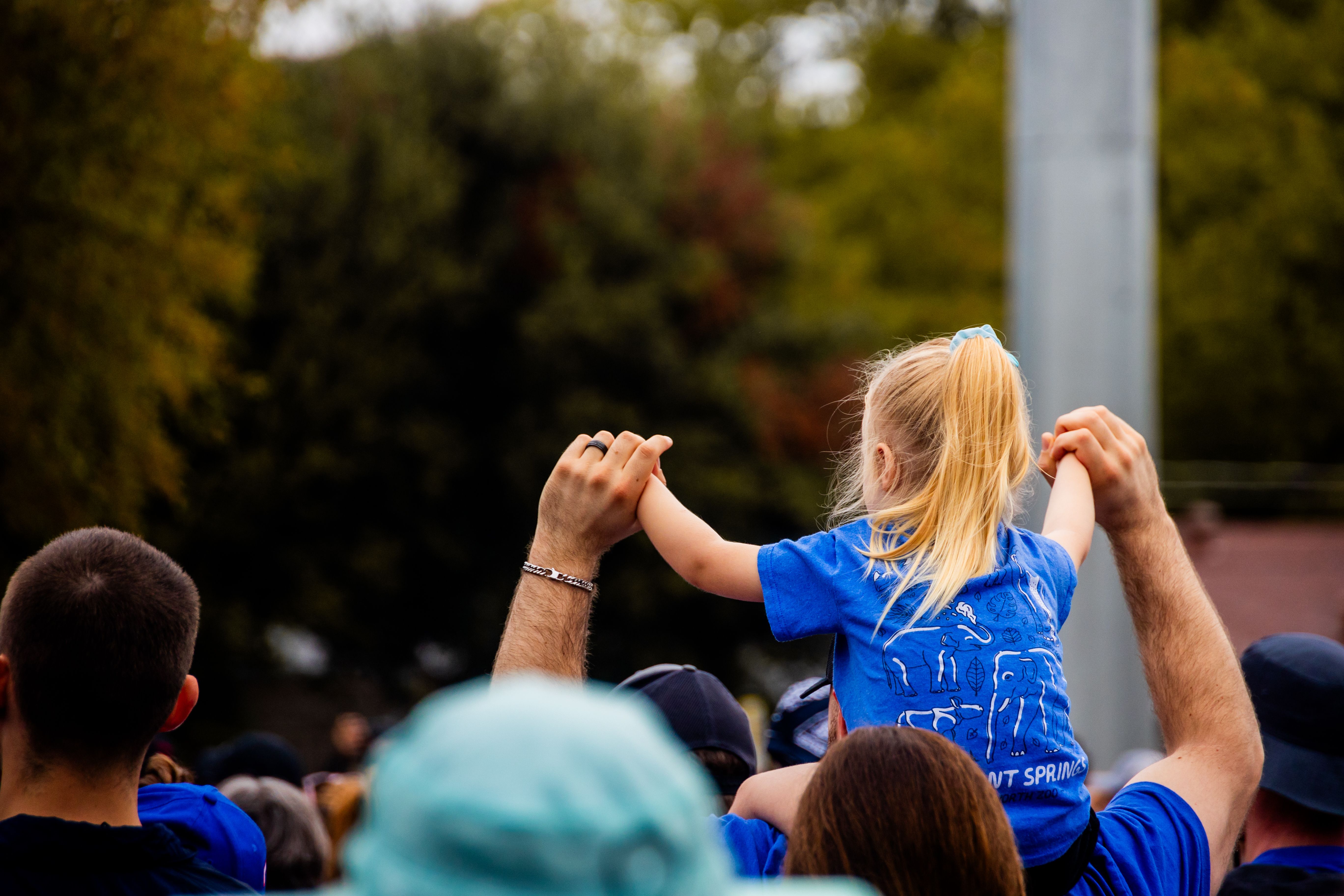 Outdoor Crowd with Child at Event · Free Stock Photo