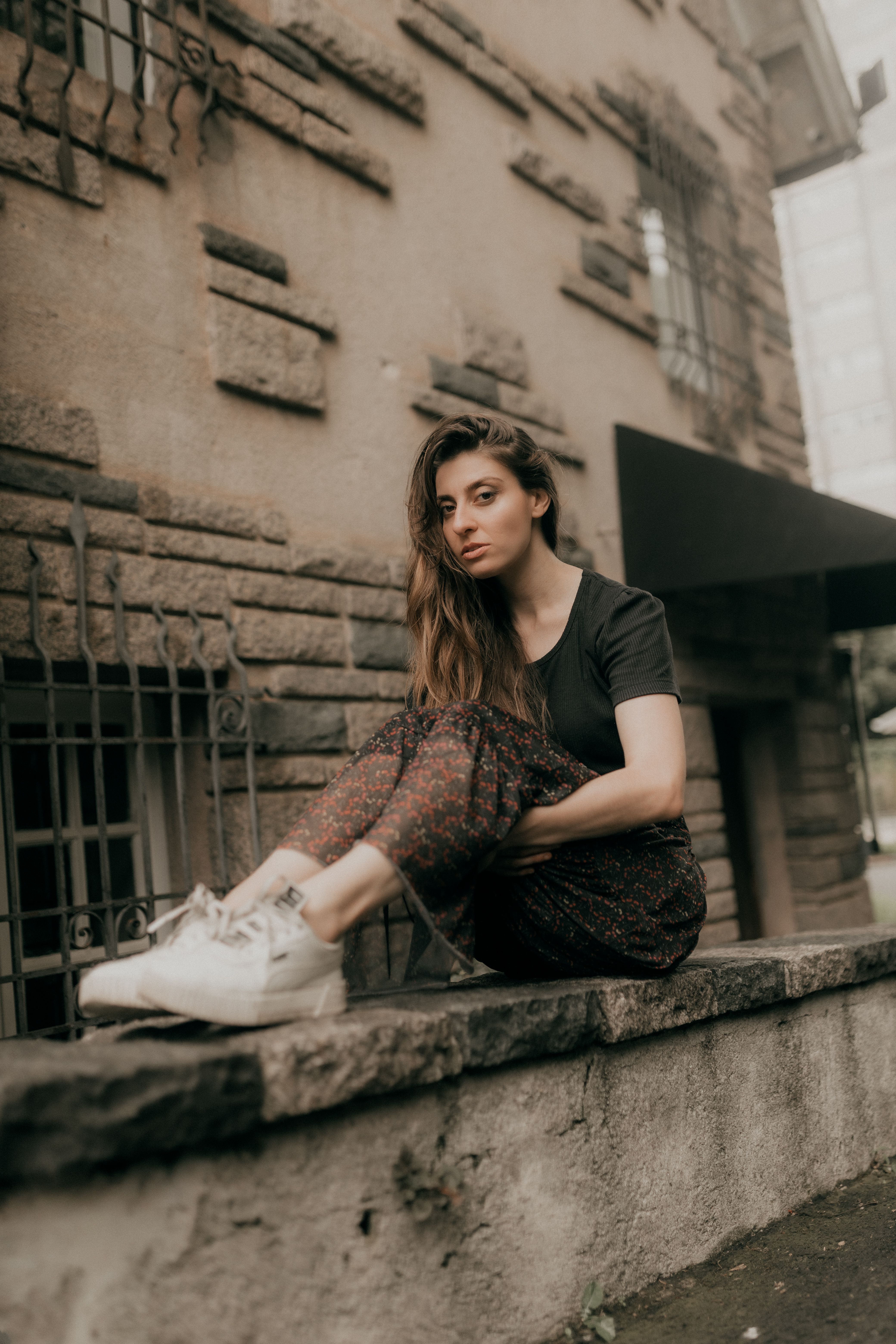 Street Portrait of Tattooed Woman in Urban Setting · Free Stock Photo
