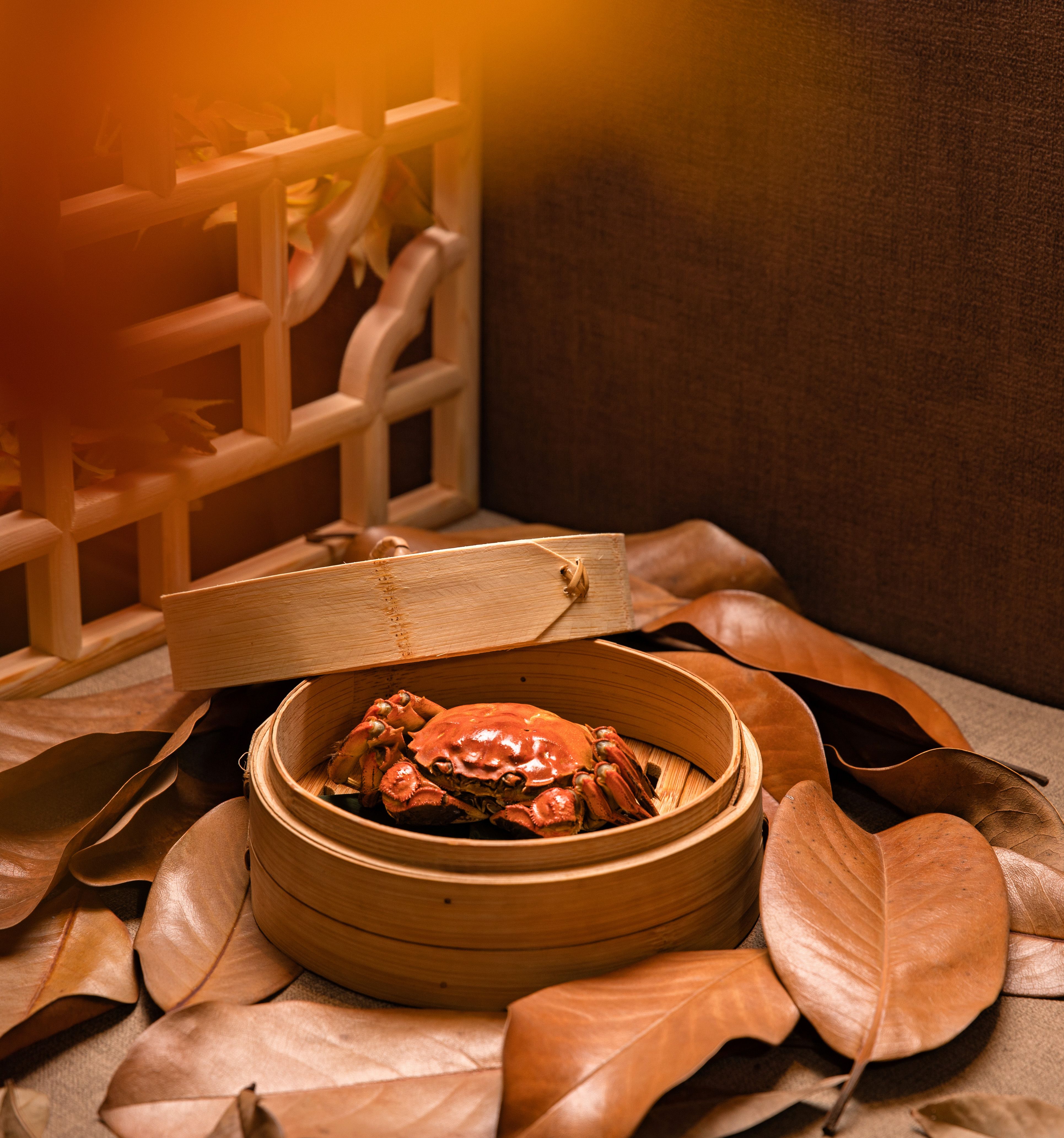 Steamed Crab in Bamboo Basket Among Autumn Leaves · Free Stock Photo