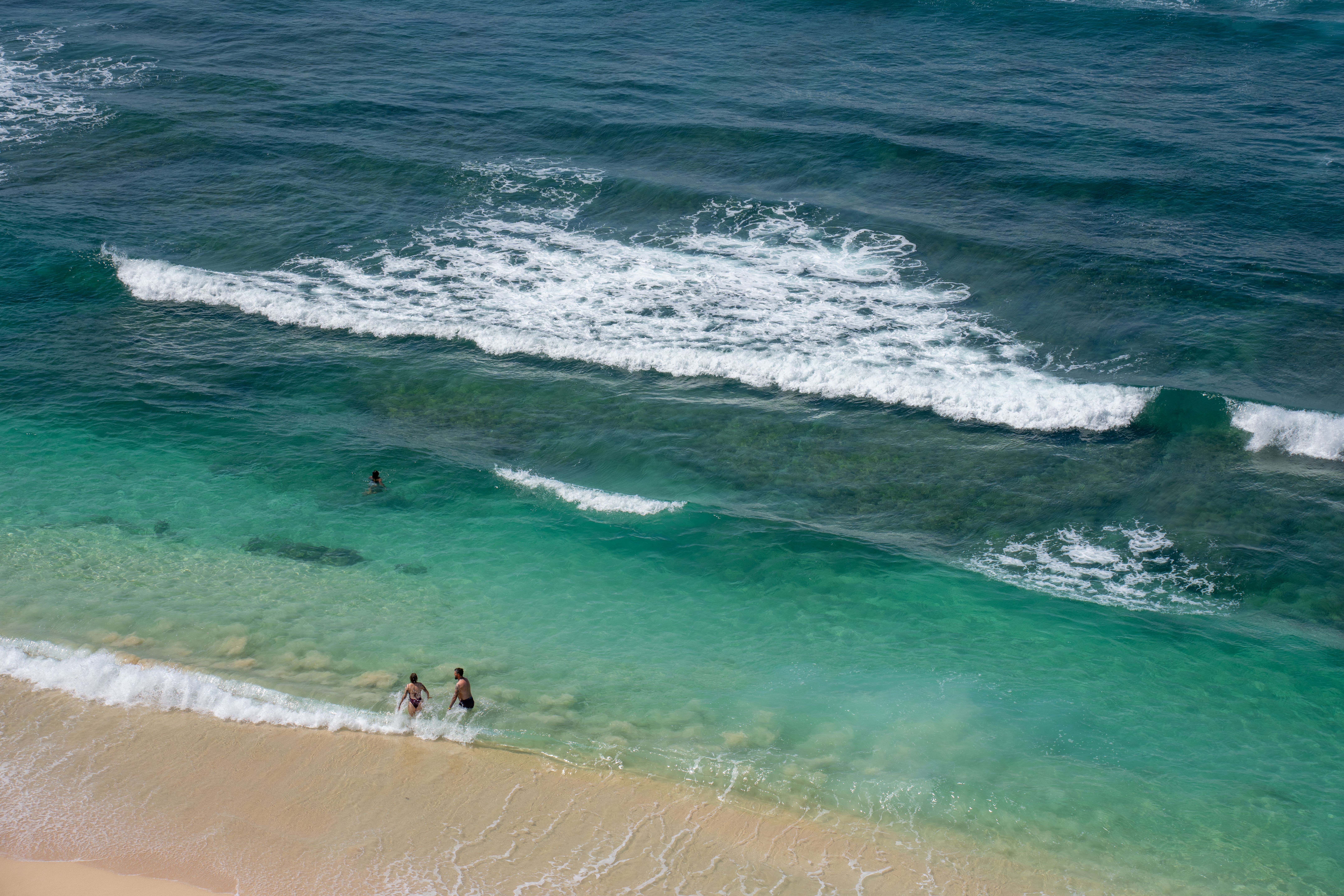 Aerial View of Bali Coastline with Clear Turquoise Waves · Free Stock Photo