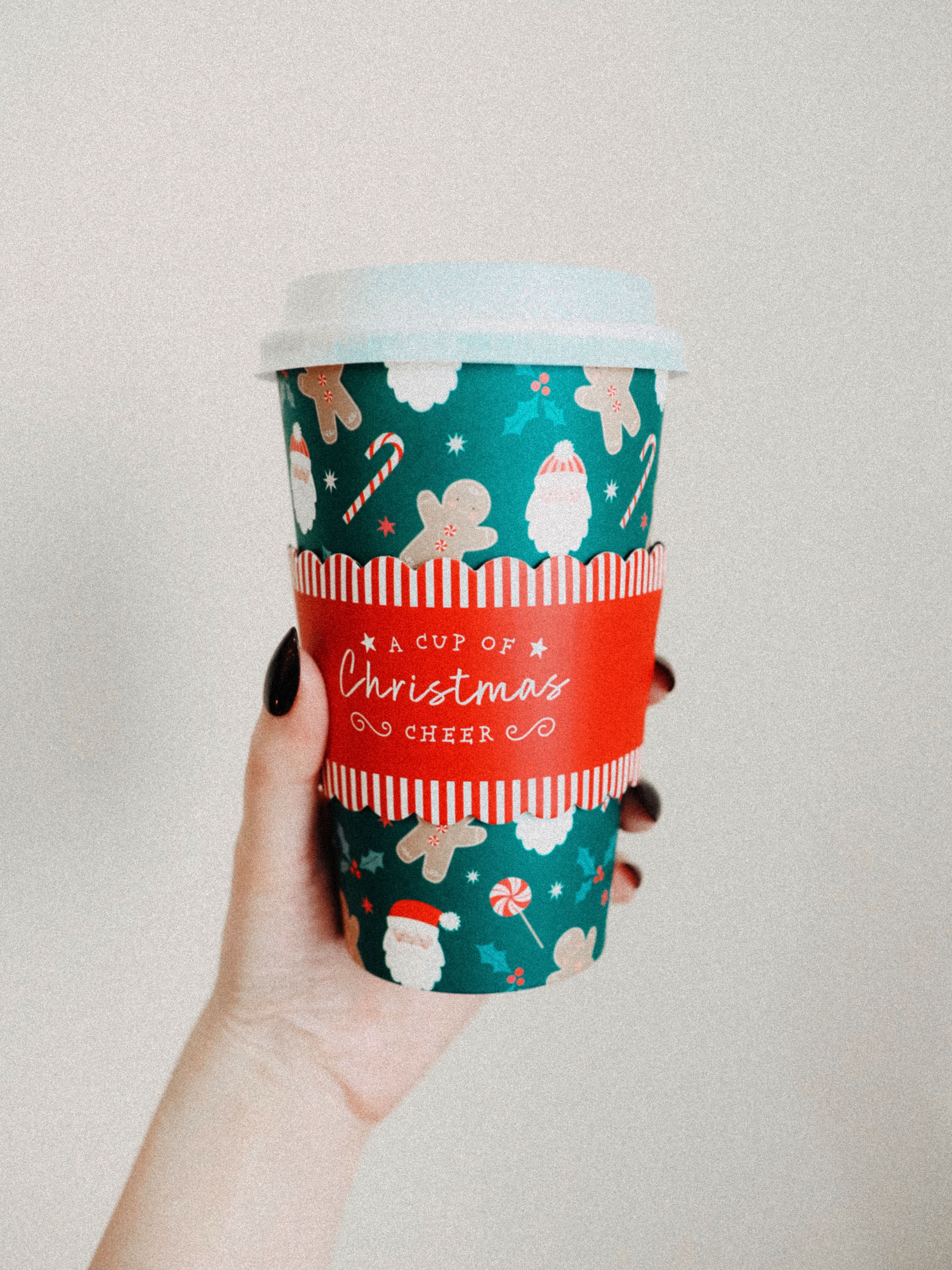 Festive Christmas Cup with Holiday Design · Free Stock Photo