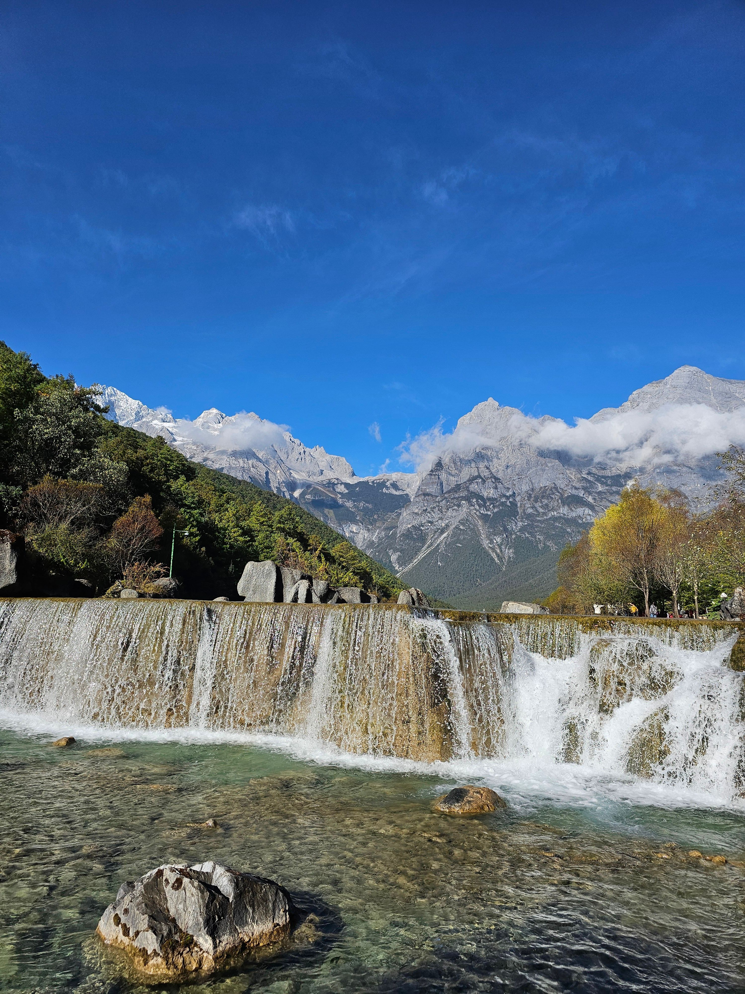 Stunning Mountain Waterfall in Bright Daylight · Free Stock Photo