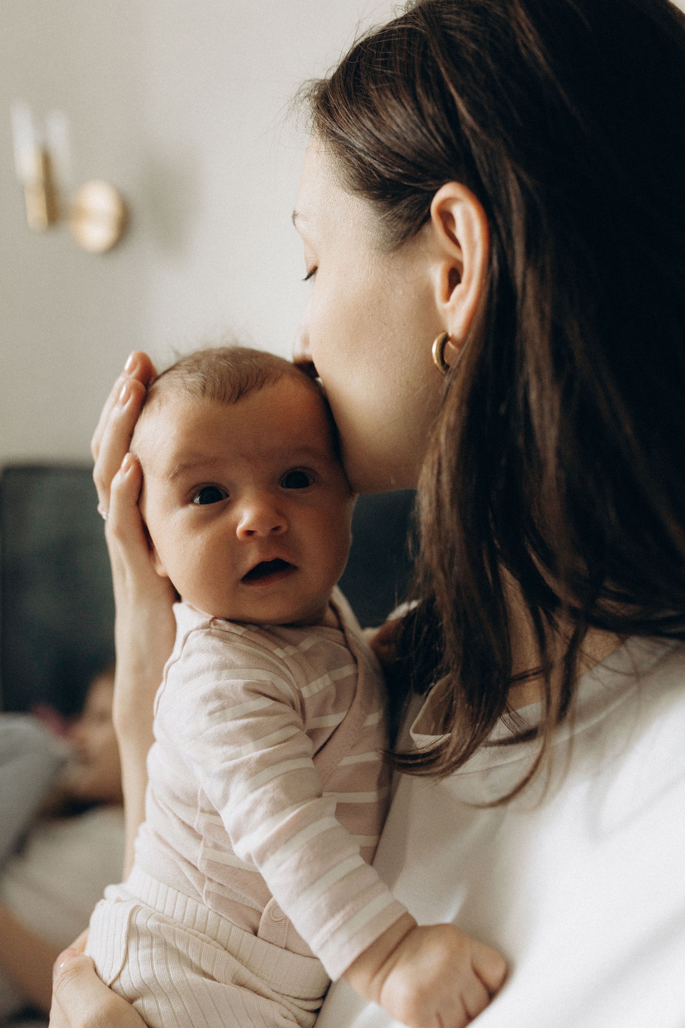 Tender Moment: Mother and Baby Bonding · Free Stock Photo