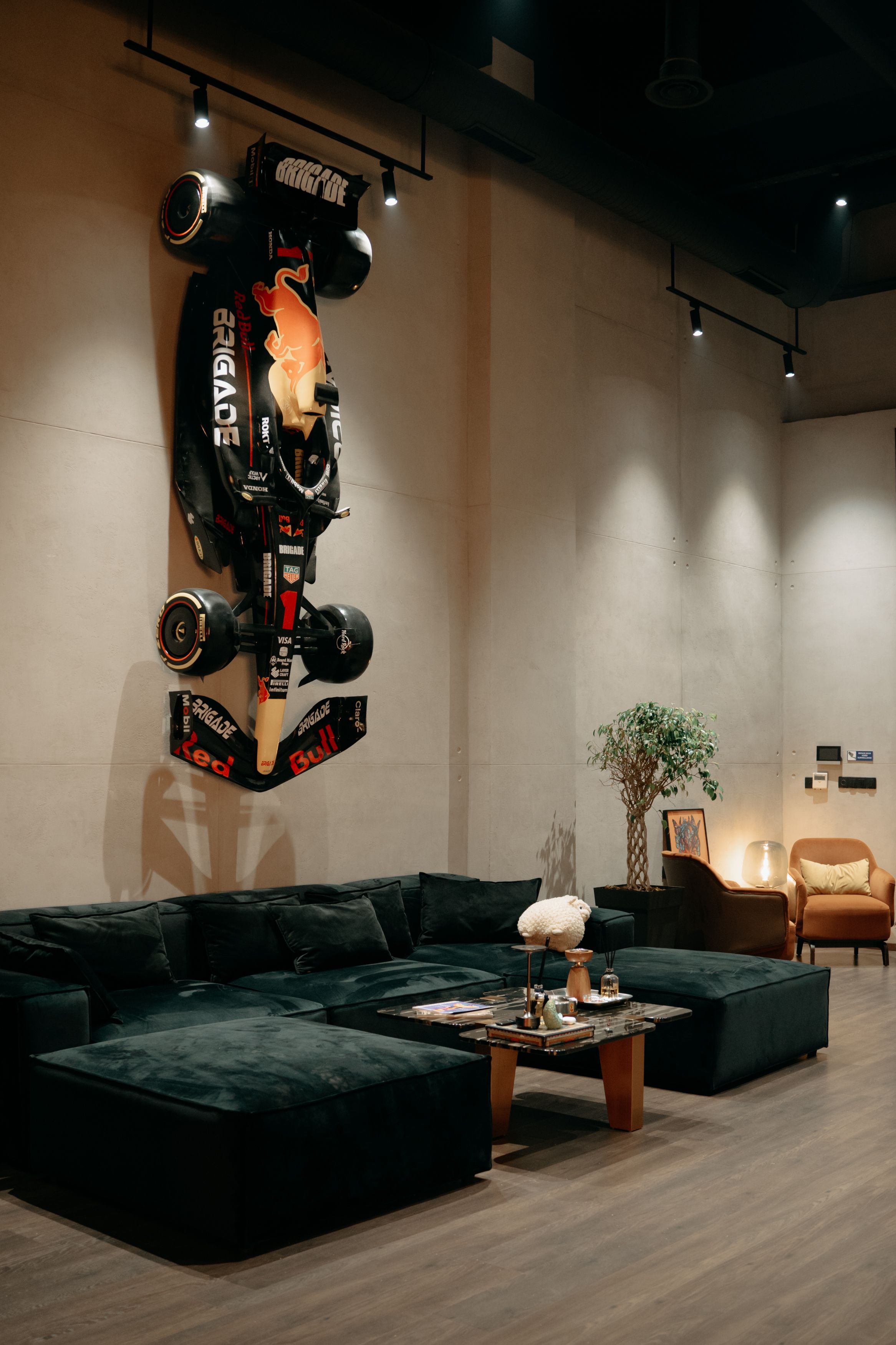 Modern Living Room with Upside Down Race Car Decor · Free Stock Photo