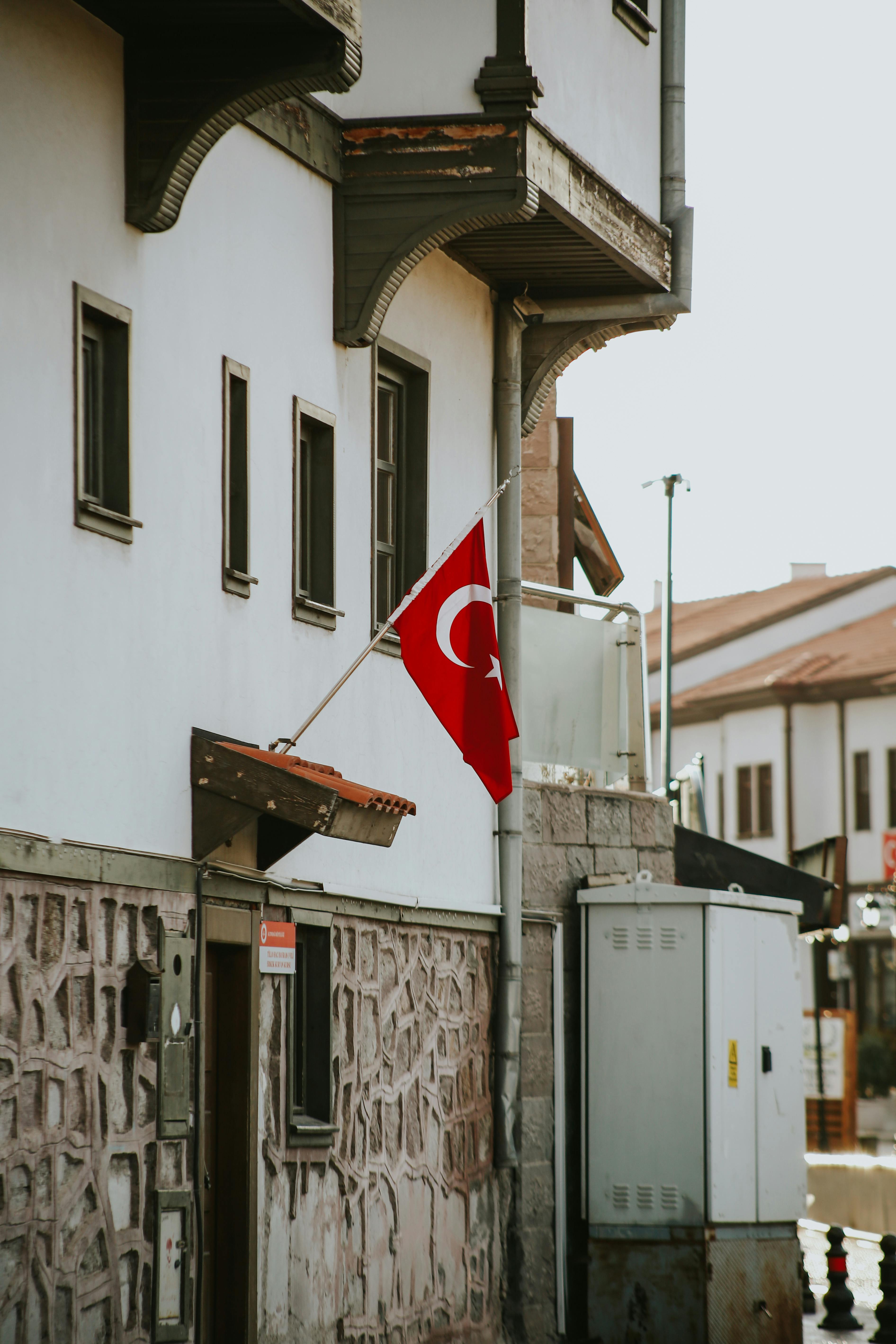 Traditional Turkish Architecture with National Flag · Free Stock Photo