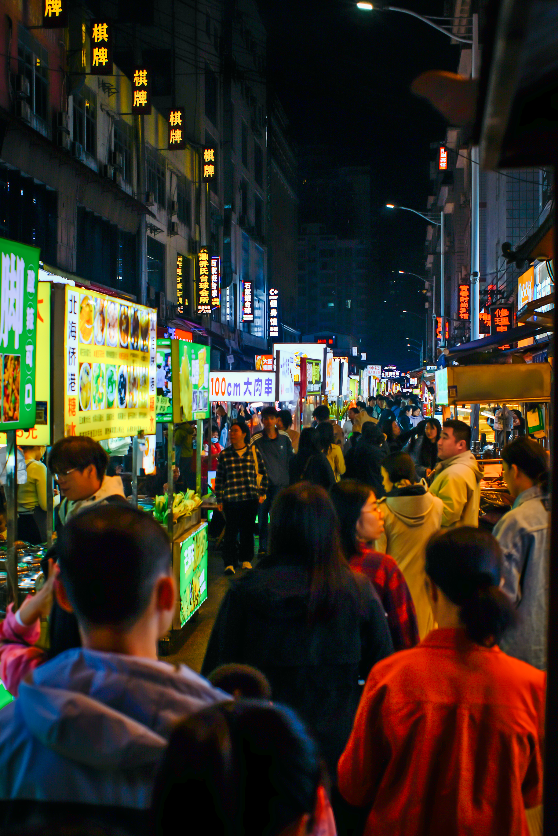 Vibrant Night Market with Busy Crowds · Free Stock Photo