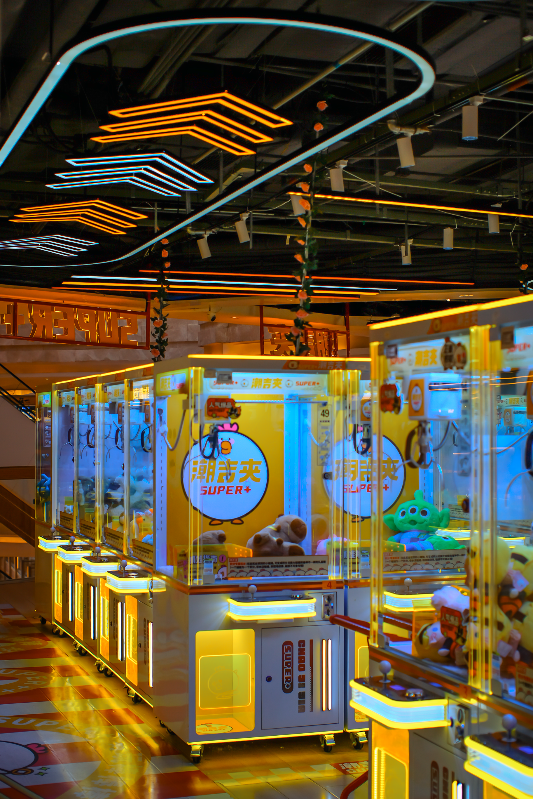 Vibrant Arcade Claw Machines with Plush Toys · Free Stock Photo